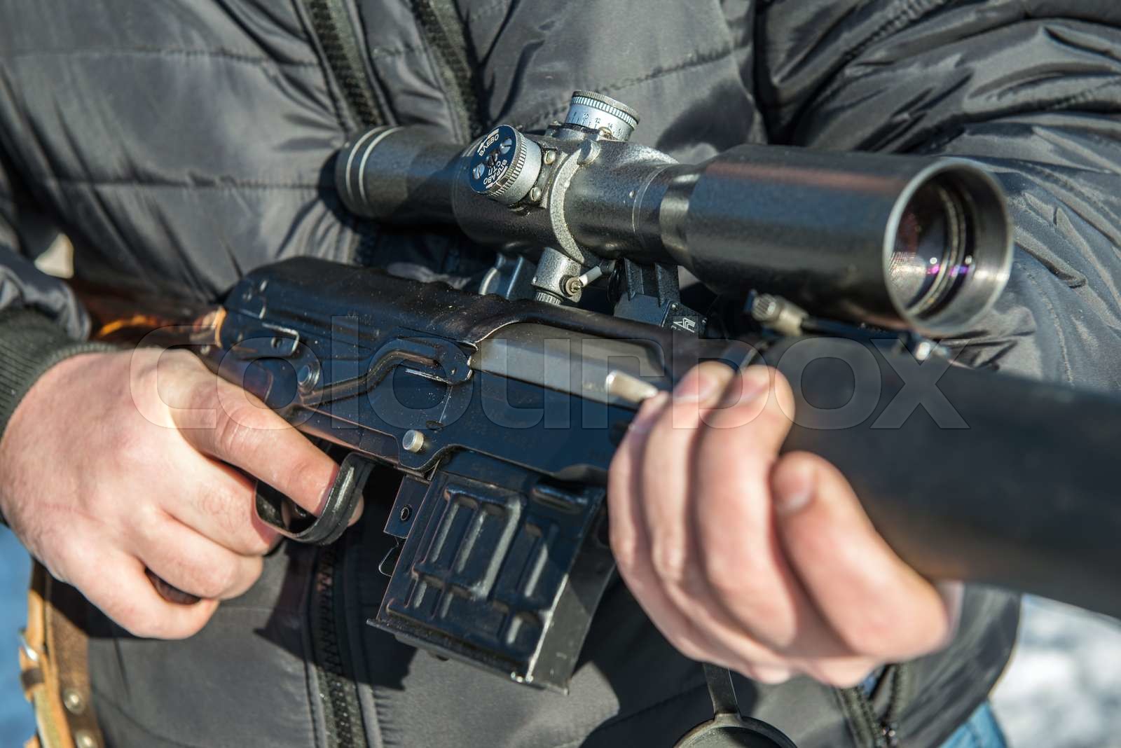 soldier or sniper holding gun with virtual screen projection and aiming ...