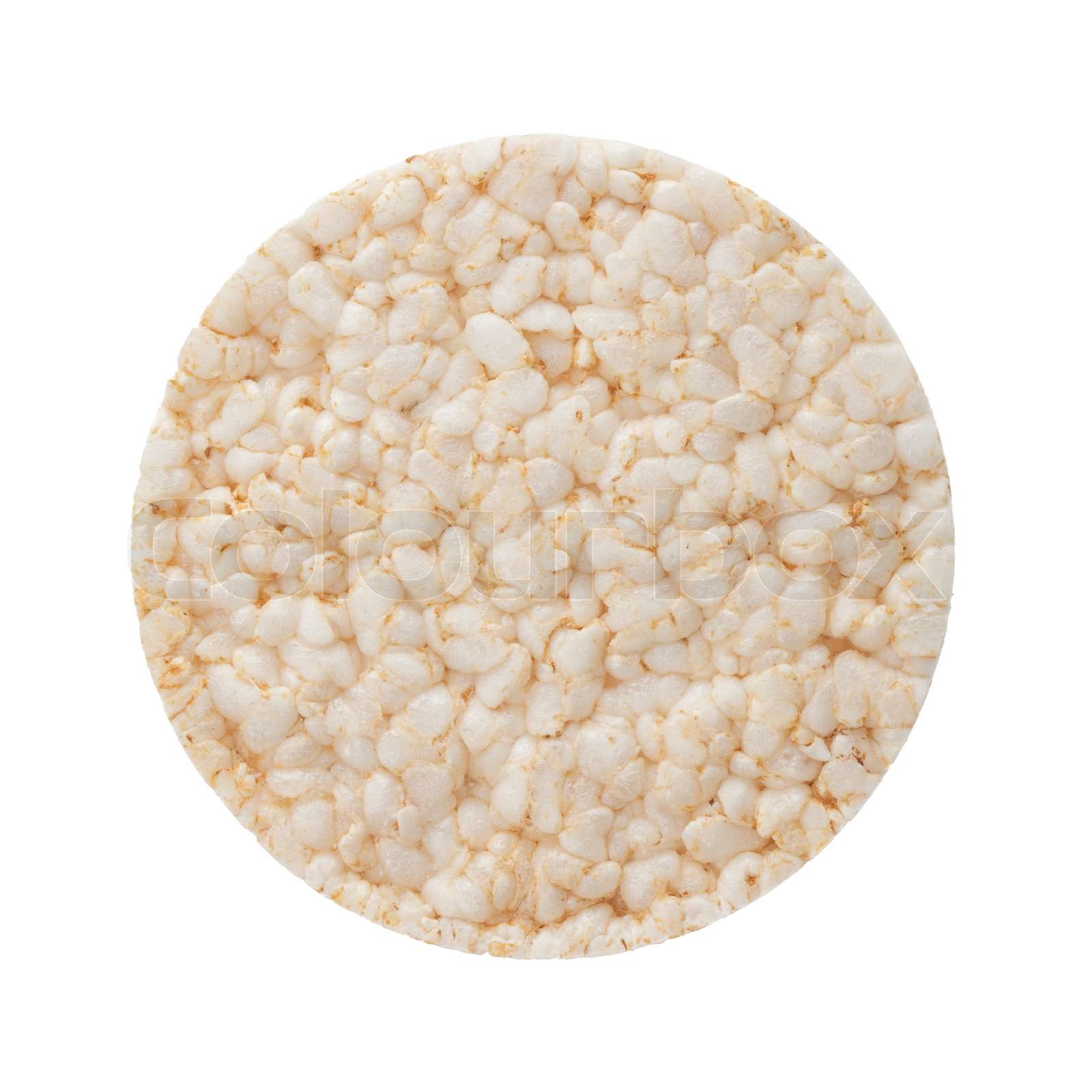 Runde pustede ris kage isoleret på hvidt | Stock foto | Colourbox