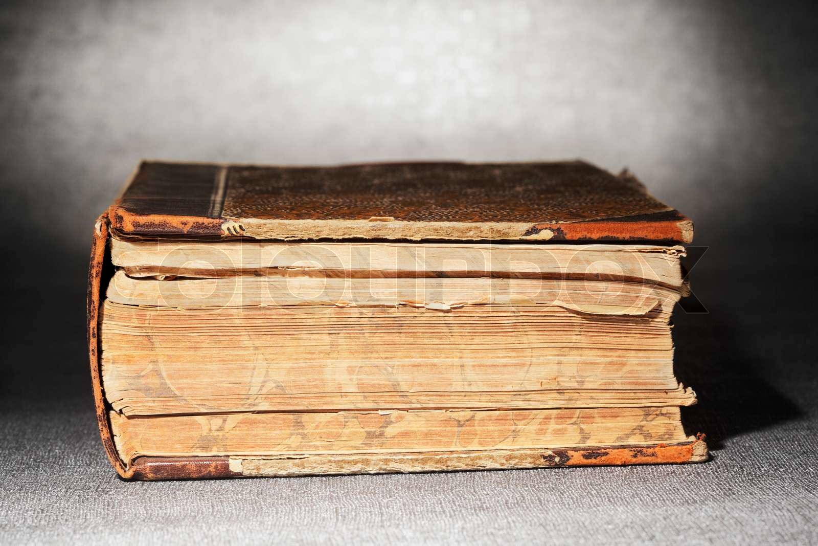 Old worn and yellowed book | Stock image | Colourbox