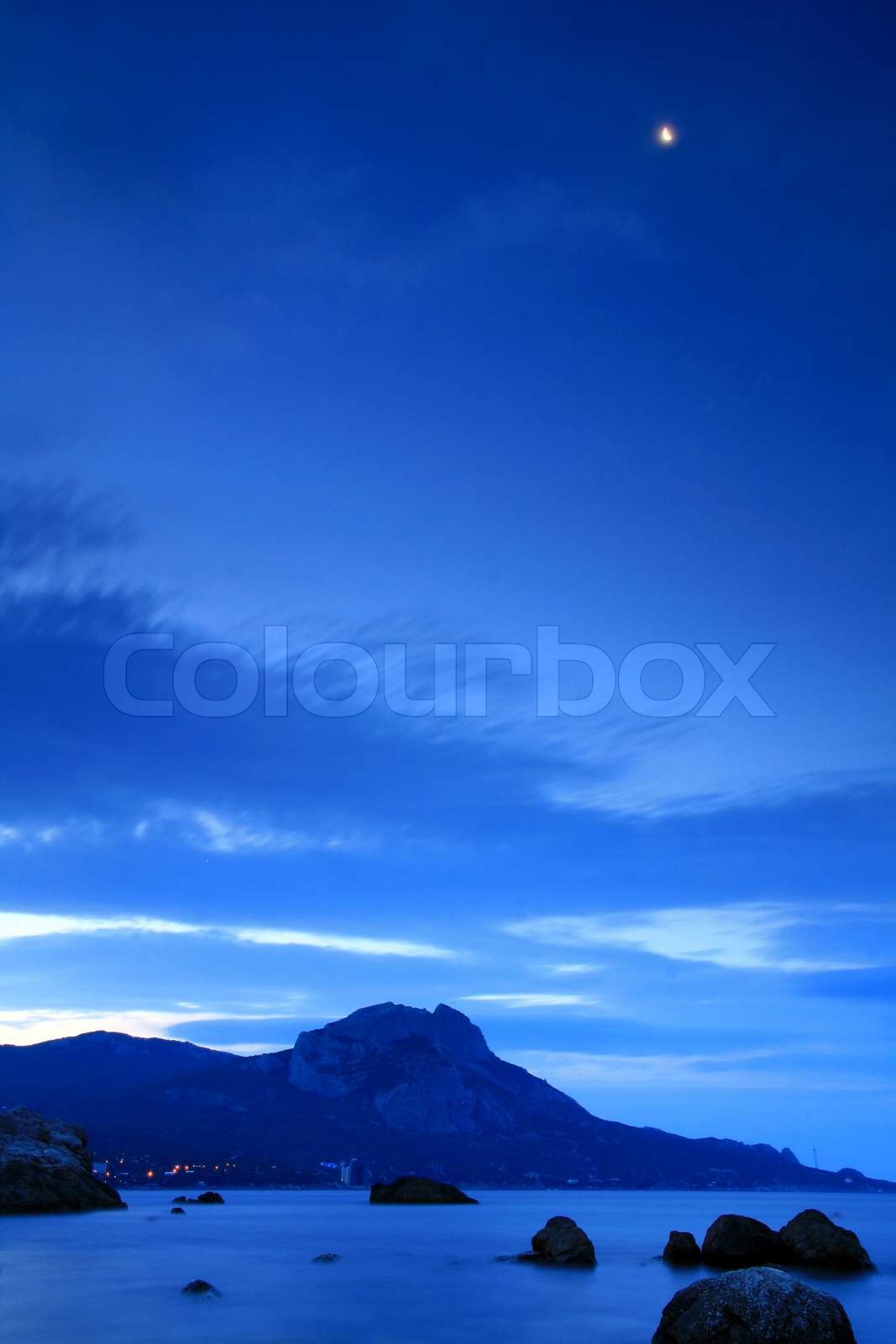 Moonrise over the ocean beach | Stock image | Colourbox
