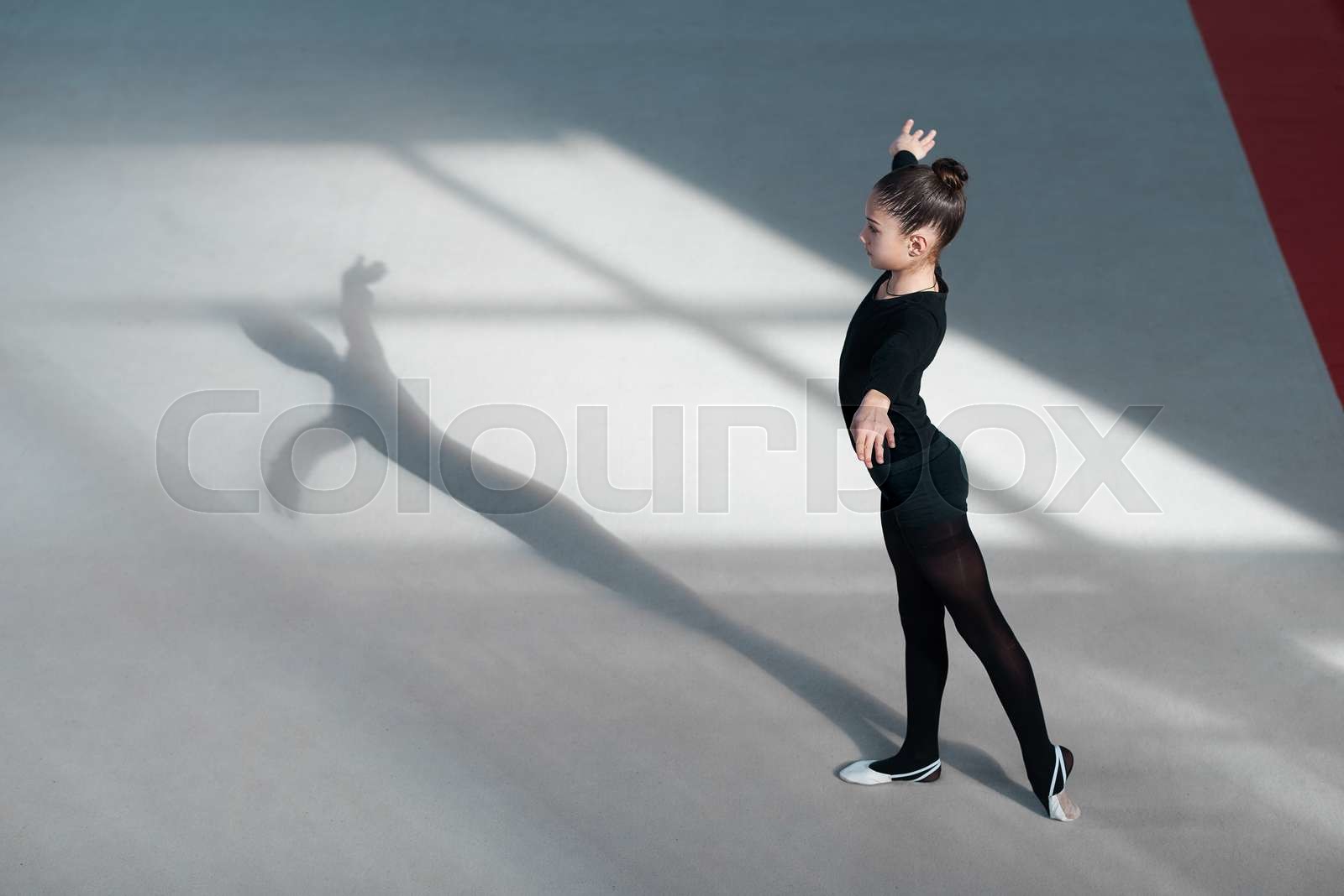 The gymnast is in the initial position | Stock image | Colourbox