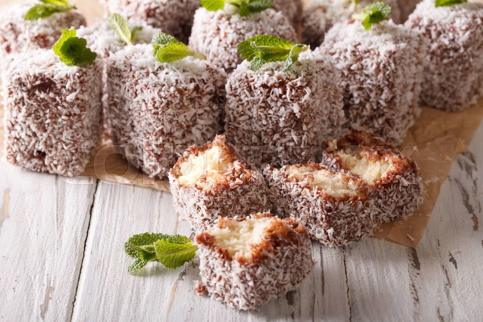 Australian Lamington cake decorated with mint close up. Horizontal ...