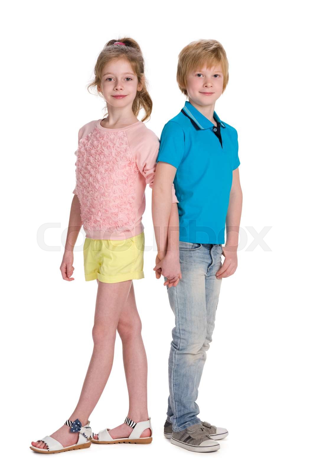 Smiling children stand together | Stock image | Colourbox