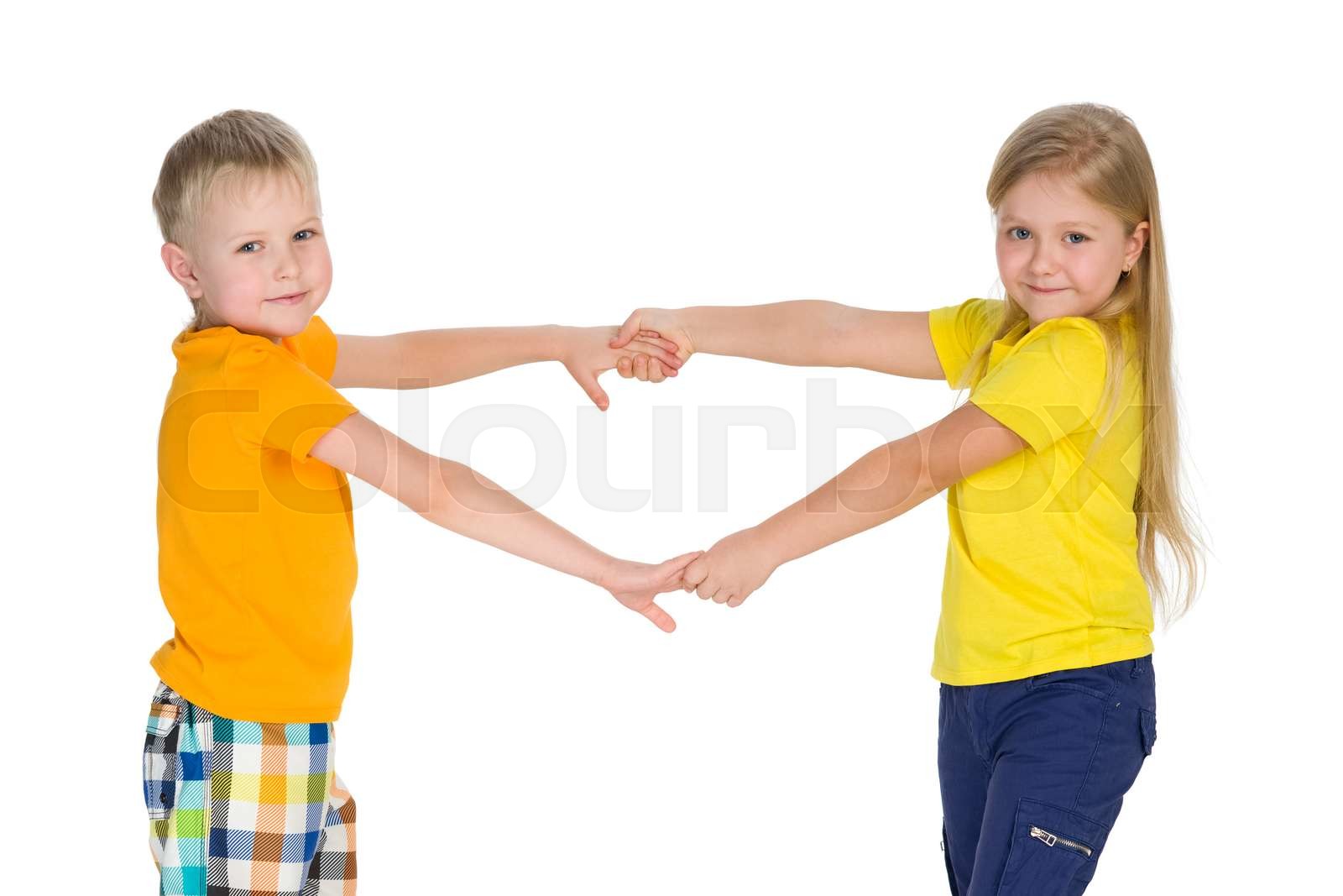 Children hold hands | Stock image | Colourbox