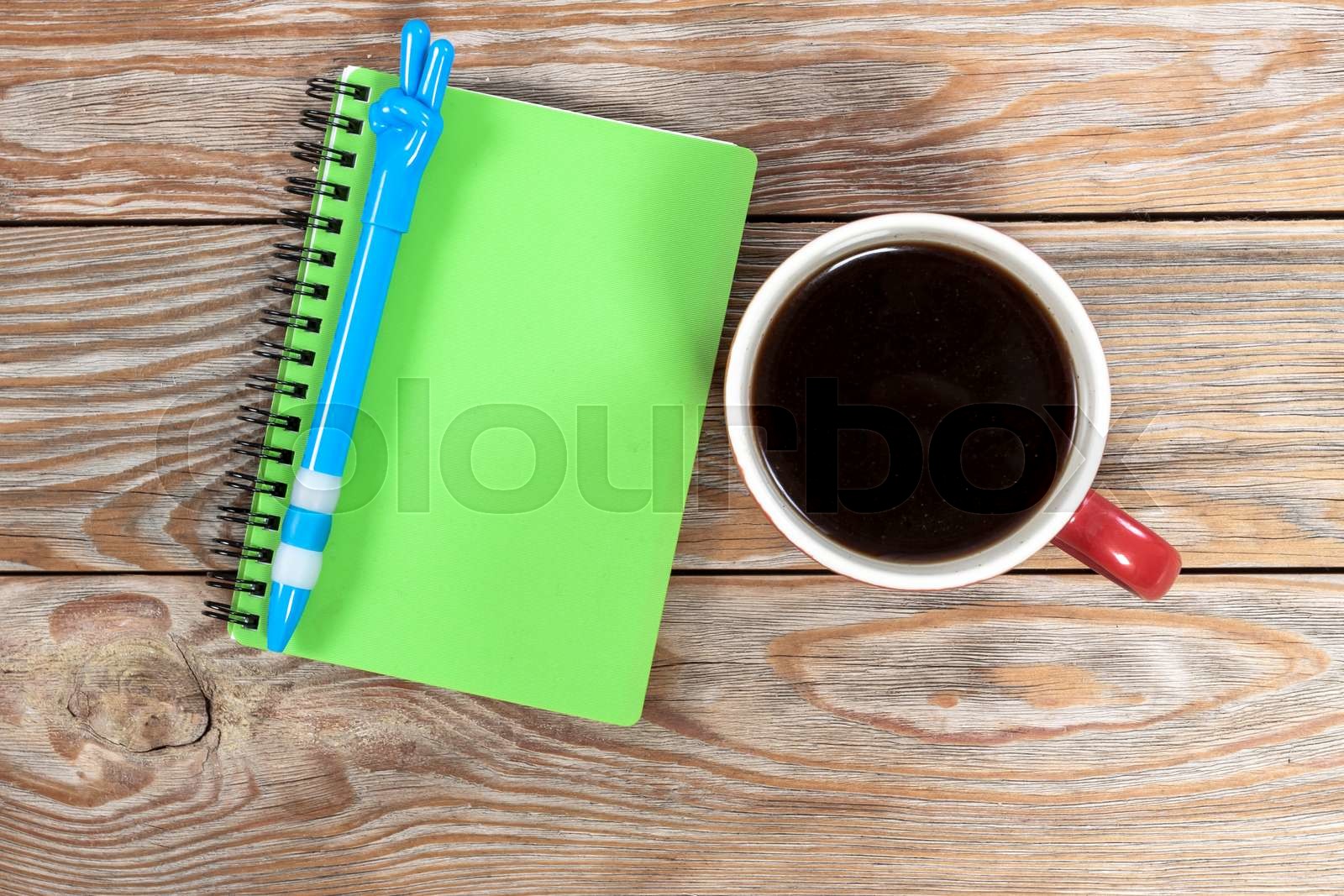 Coffee cup with notebook | Stock image | Colourbox