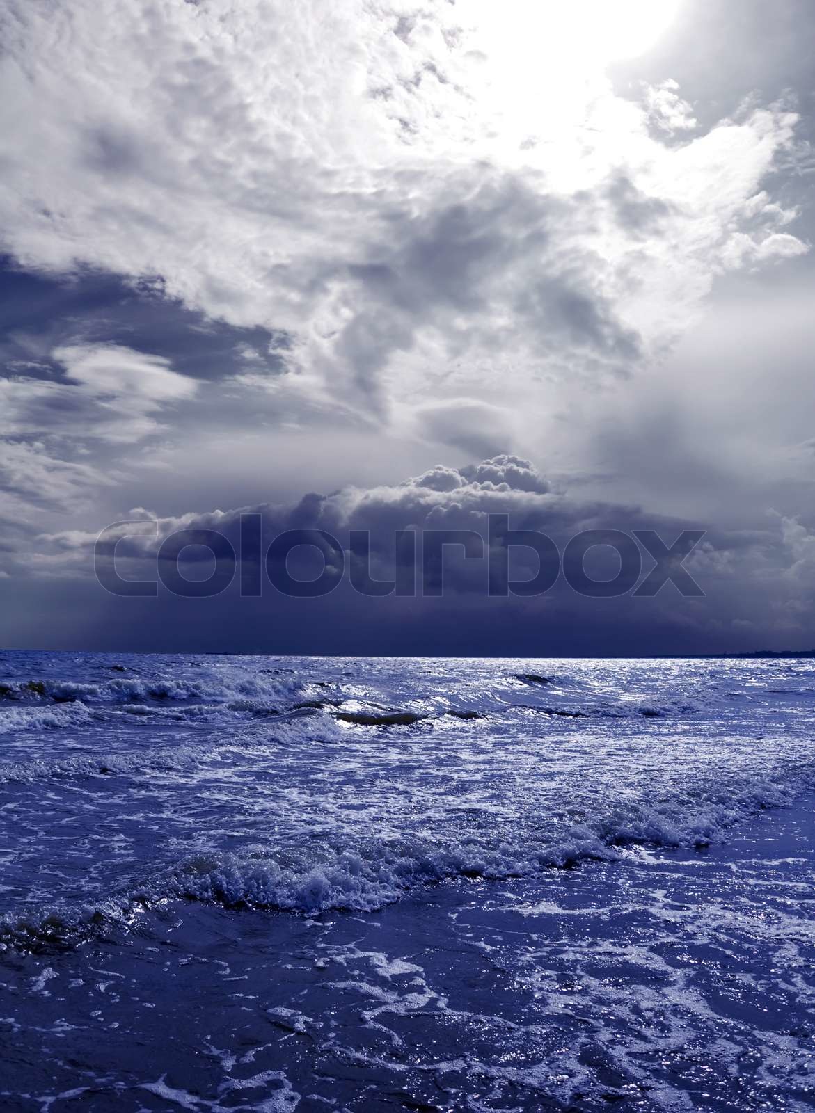 Dark stormy sky over the wave ocean | Stock image | Colourbox