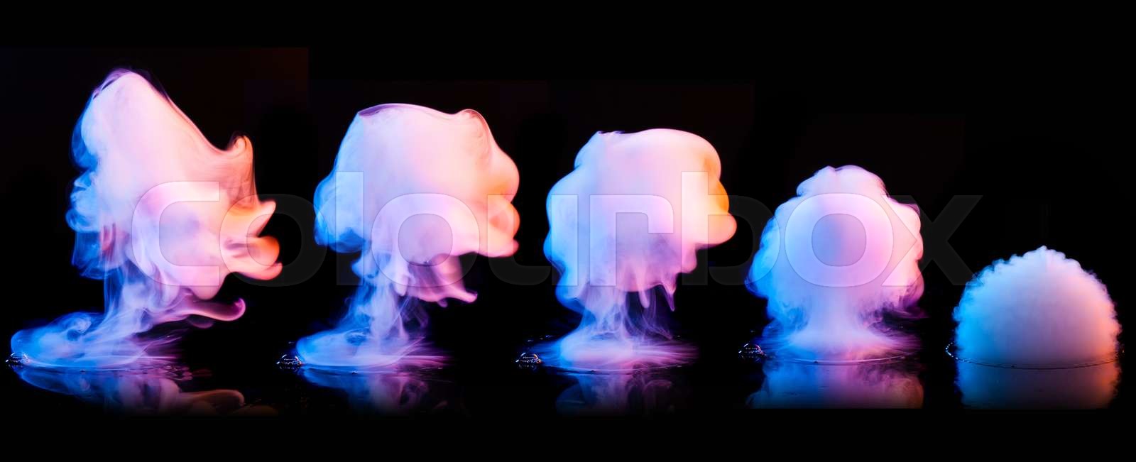 Color smoke explosion isolated on black | Stock image | Colourbox