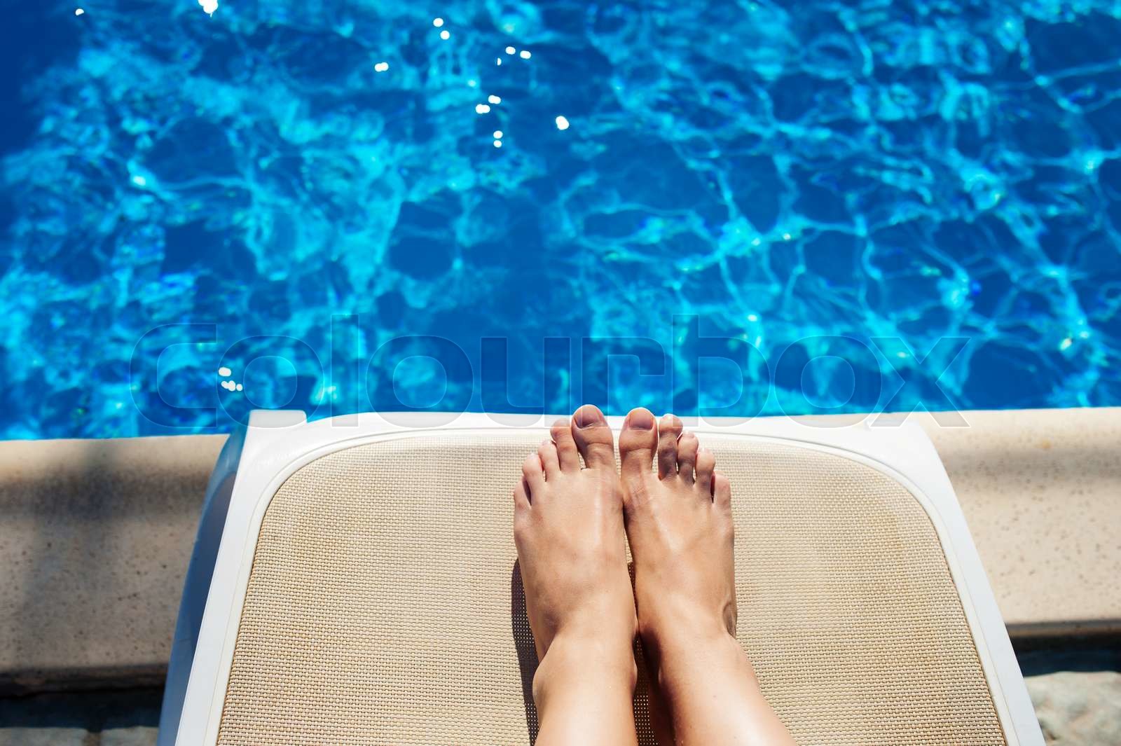 Beautiful Feet and toes by the swimming pool | Stock image | Colourbox