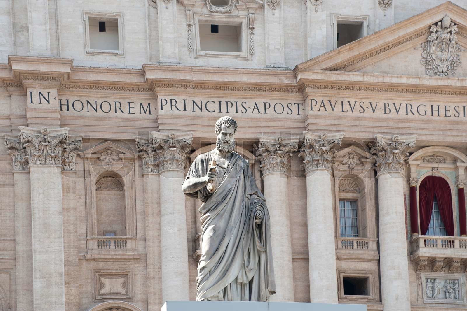 Statue facing the facade of Saint Peter's Basilica in Rome | Stock ...