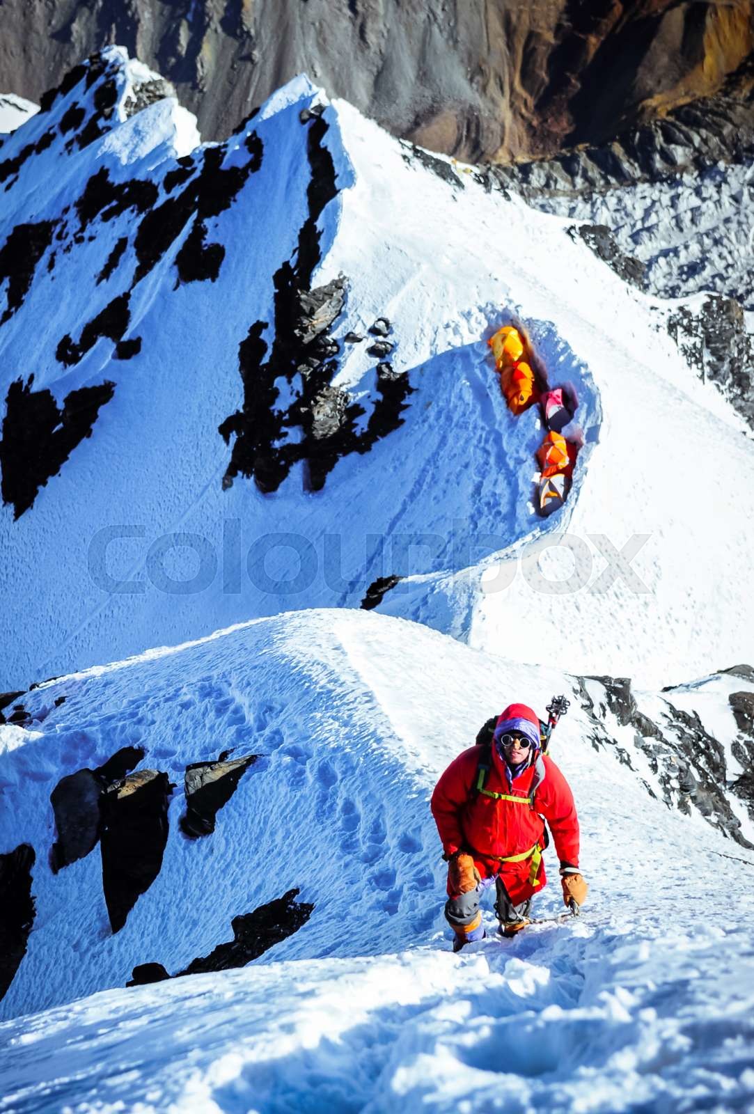 Group of climbers reaching the summit | Stock image | Colourbox