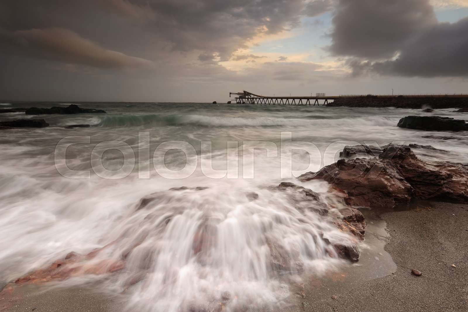 Shell Cove flows on a stormy day | Stock image | Colourbox