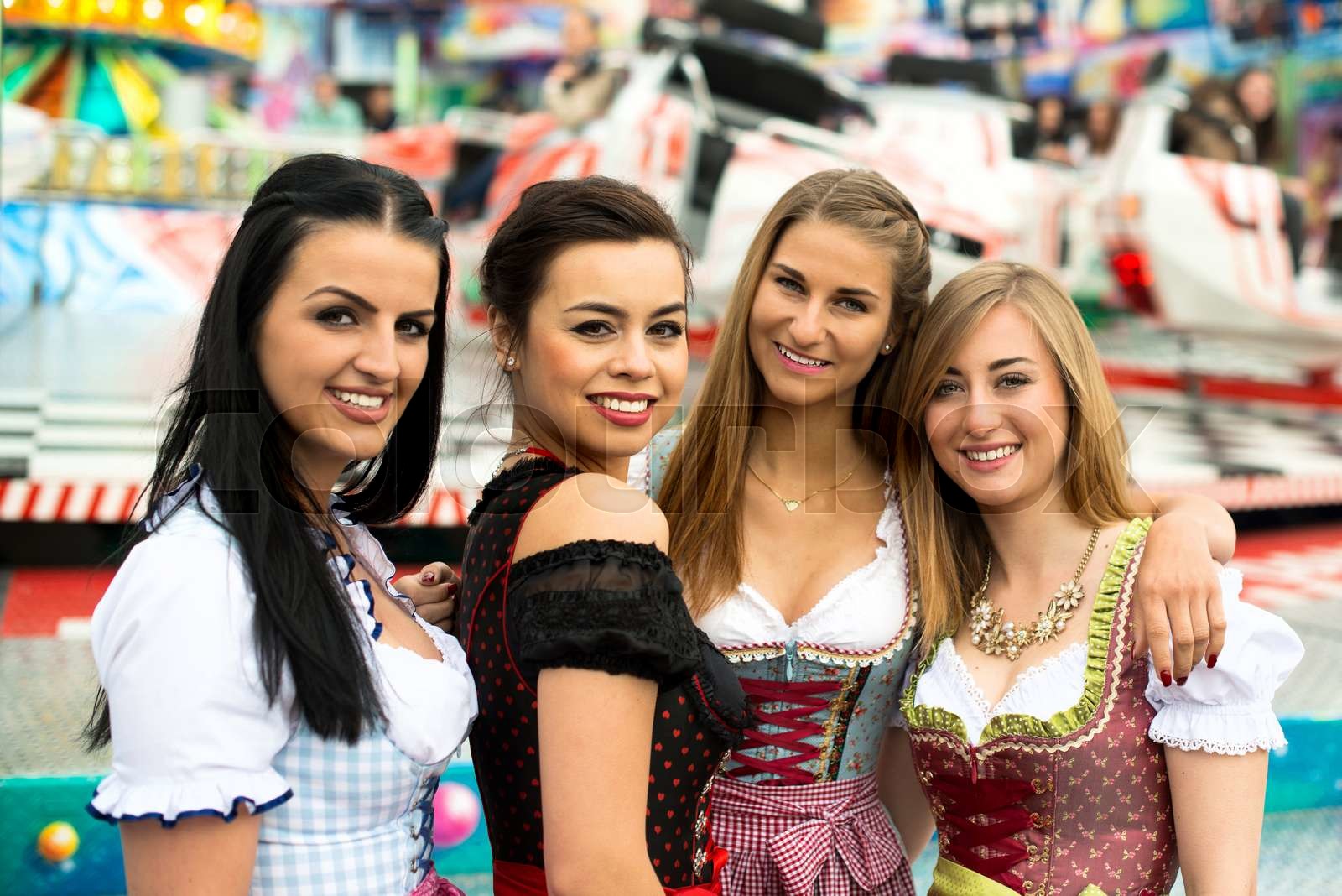 Gorgeous young women at German funfair | Stock image | Colourbox