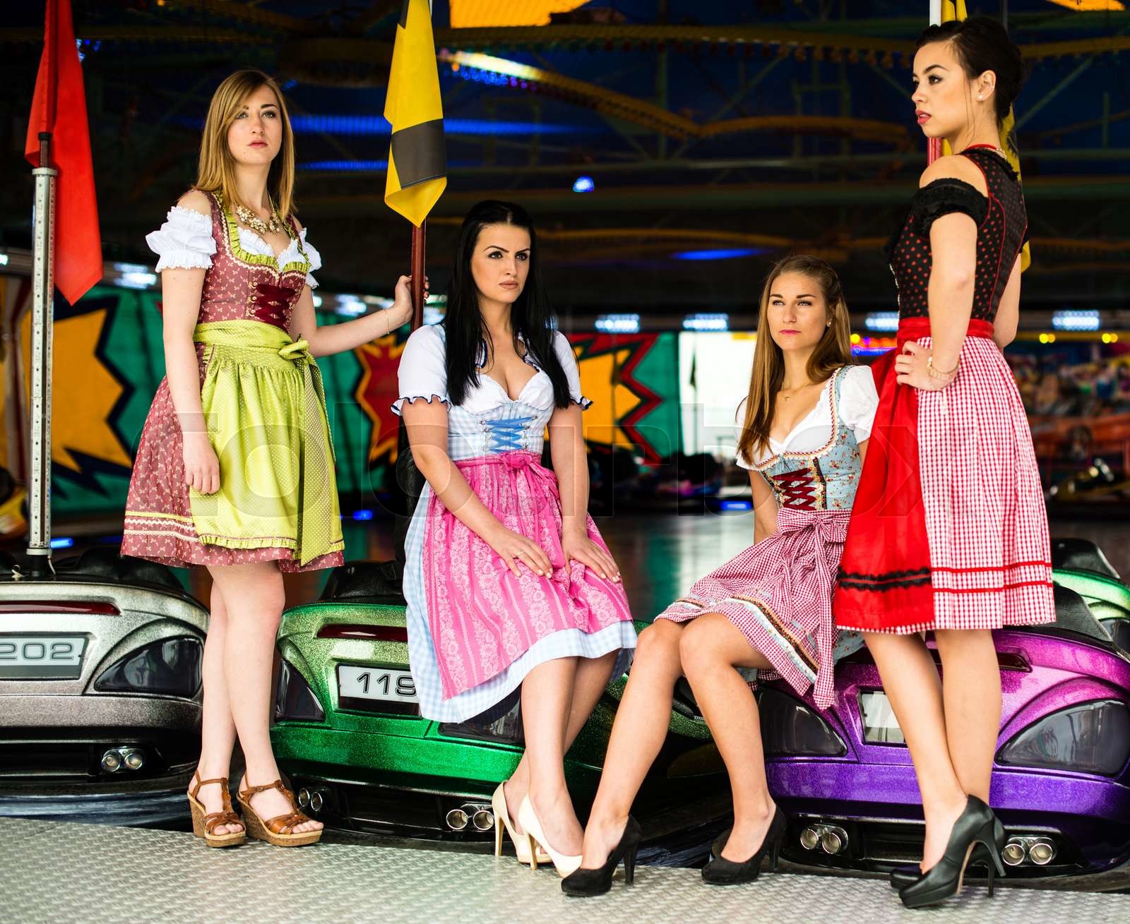 Gorgeous young women at German funfair | Stock image | Colourbox