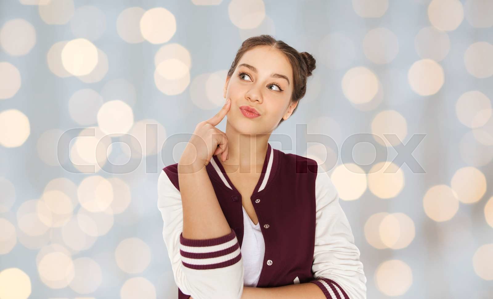 happy pretty teenage girl thinking | Stock image | Colourbox
