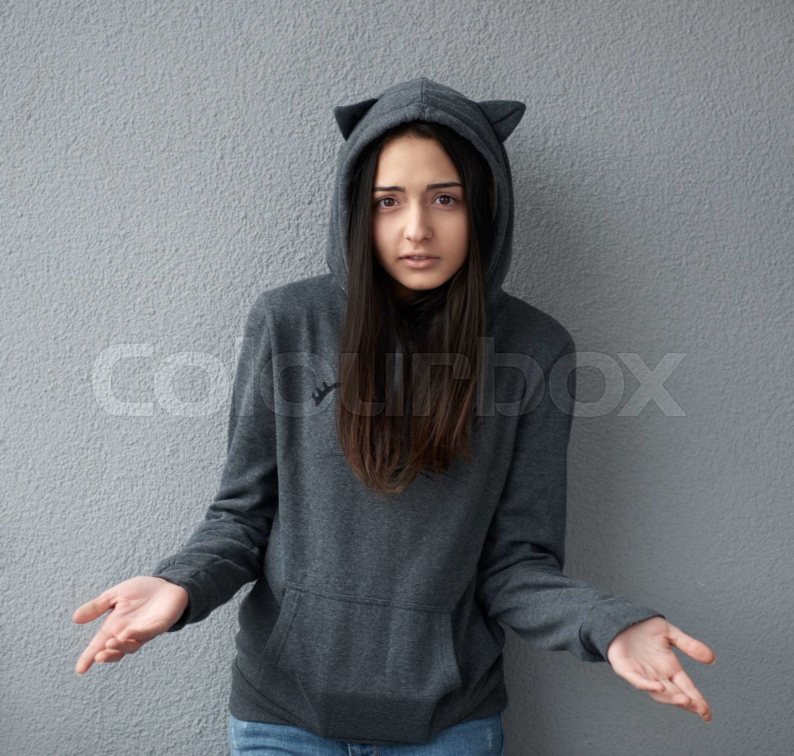 Pretty teenager girl asks question | Stock image | Colourbox