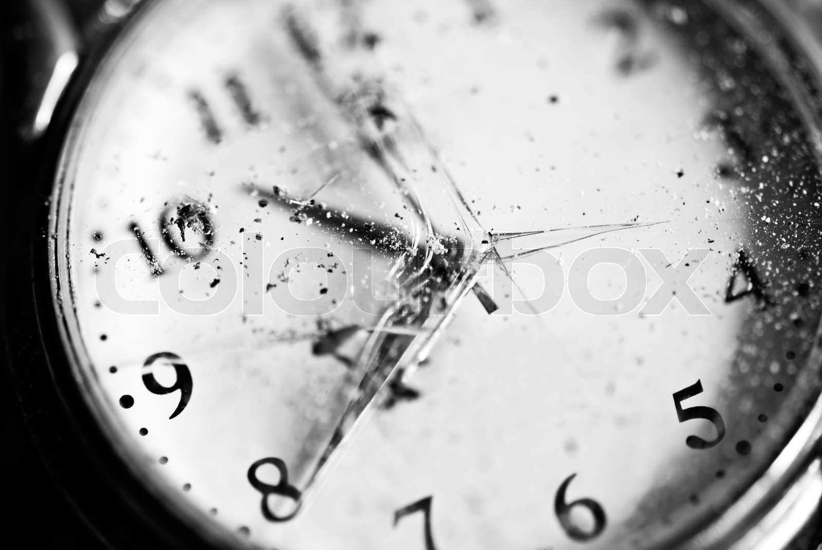 Broken time concept. Old dusty pocket clock with broken glass. Shallow ...