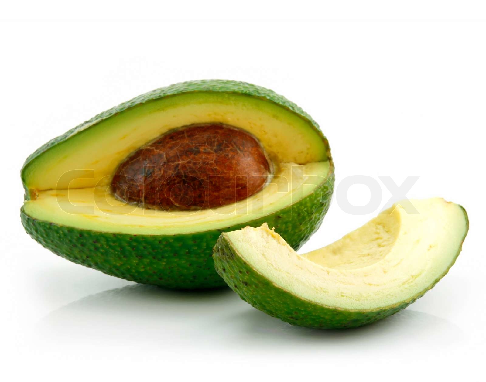 Ripe Sliced Avocado Isolated on White Background | Stock image | Colourbox