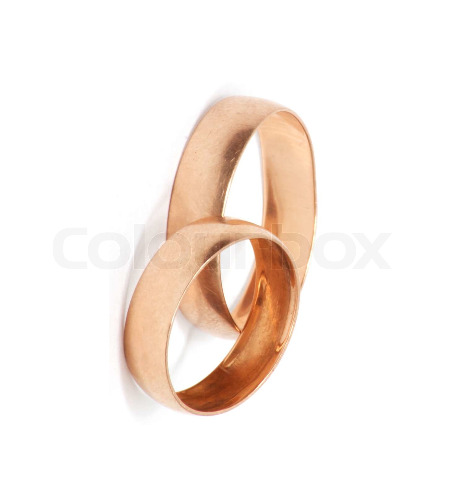 Two gold ring isolated on white | Stock image | Colourbox