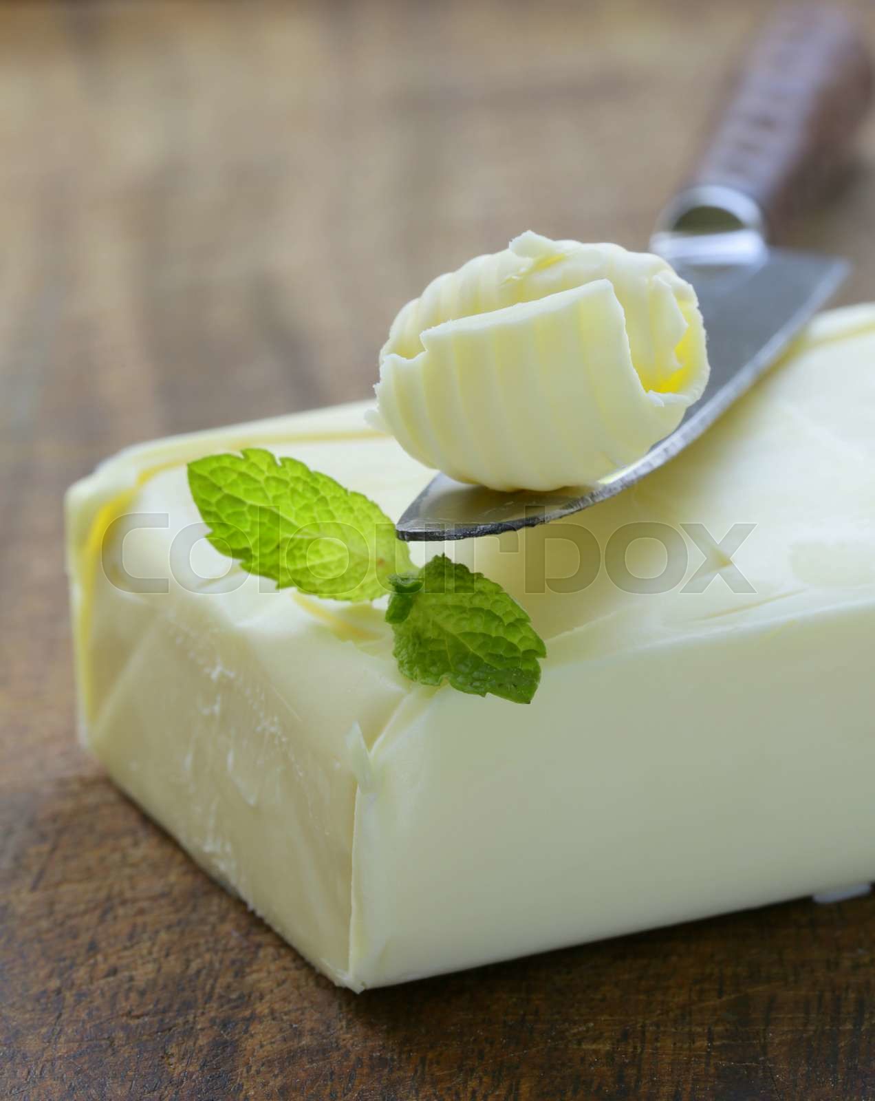 fresh yellow butter | Stock image | Colourbox