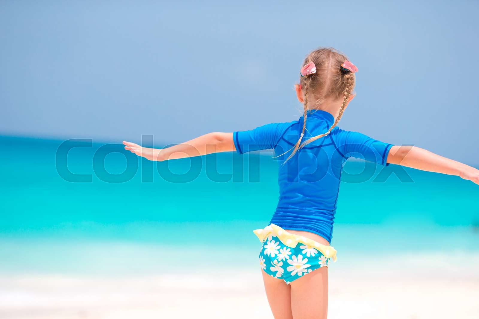 Little girl at beach during summer vacation | Stock image | Colourbox