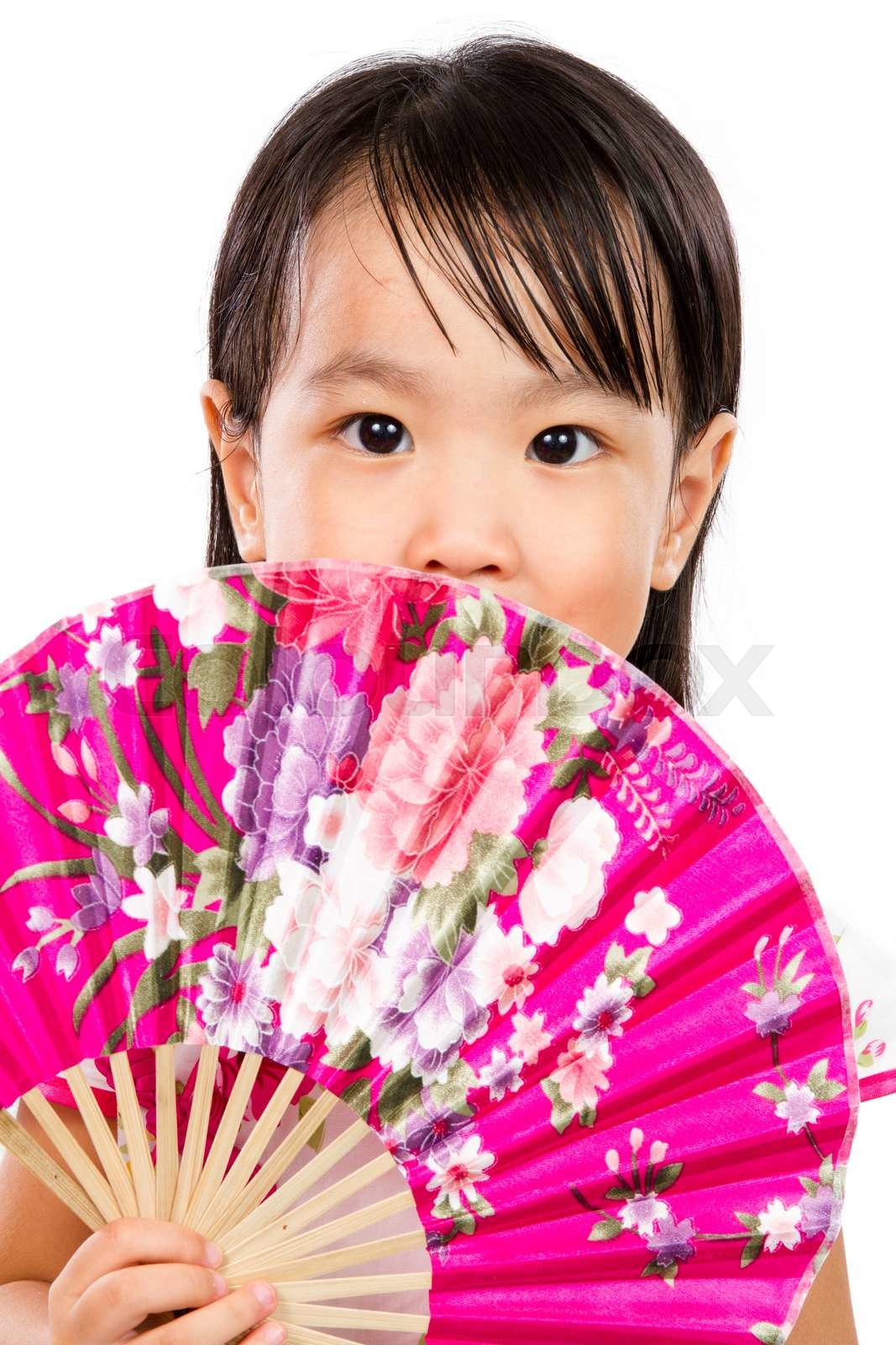 Asian Little Chinese Girl Holding Oriental Fan | Stock image | Colourbox