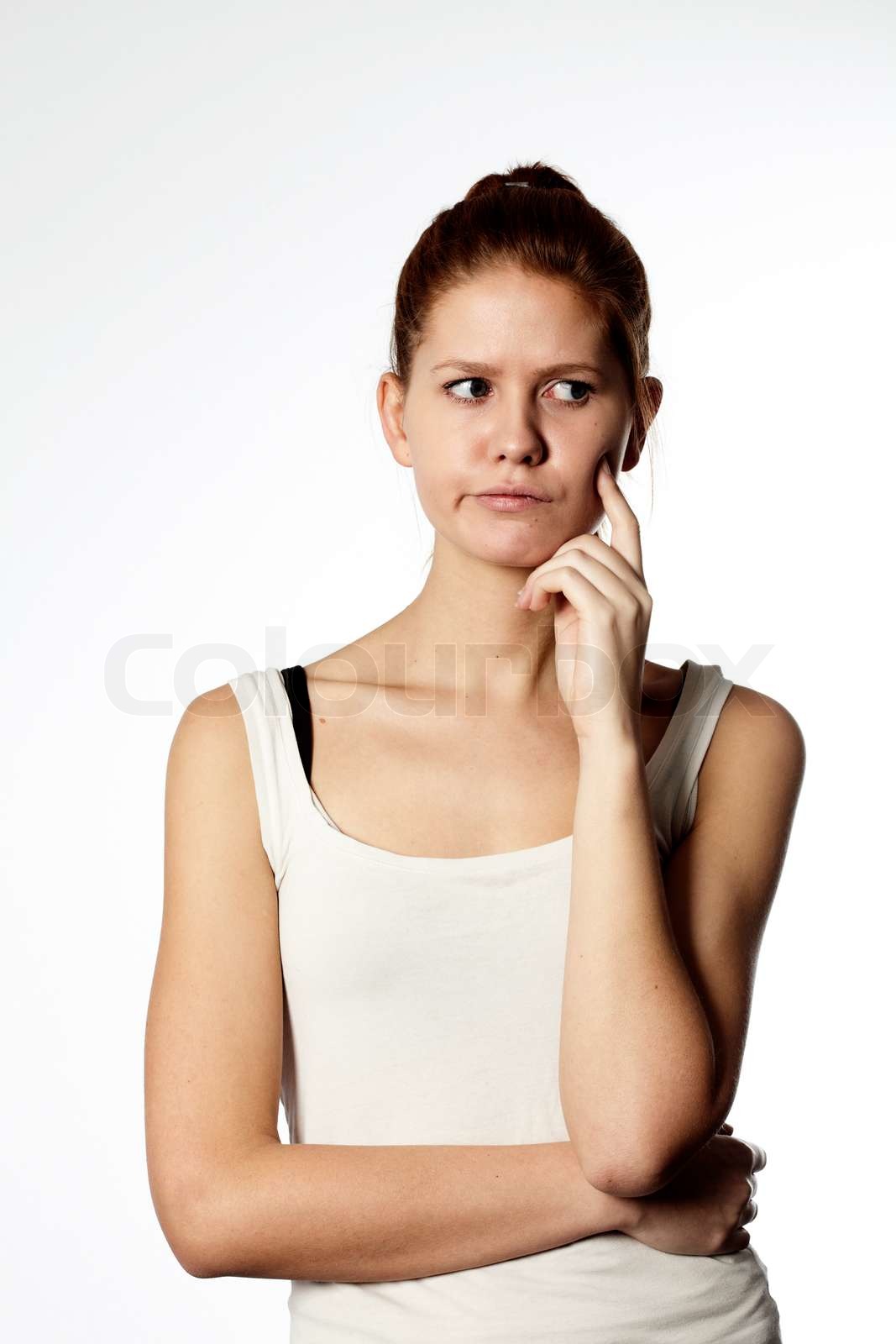 eine junge Frau, die sich wundern, Schuß auf einem einfachen weißen ...