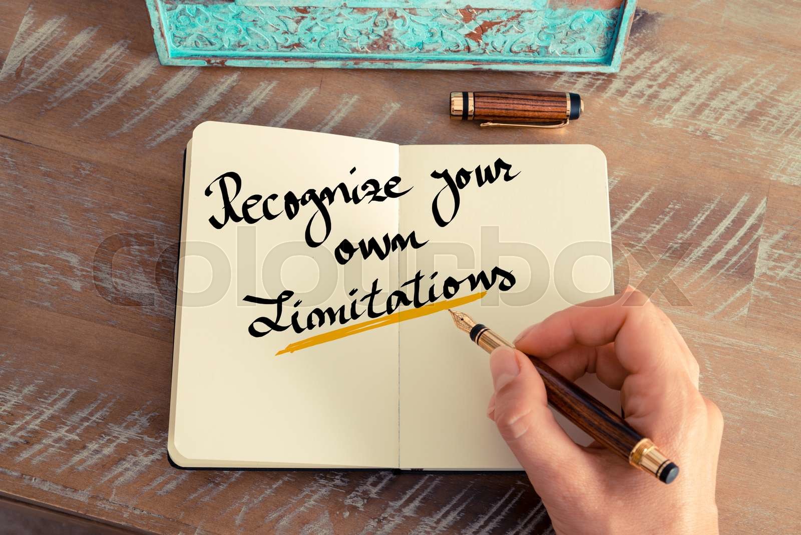 Handwritten text RECOGNIZE YOUR OWN LIMITATIONS | Stock image | Colourbox