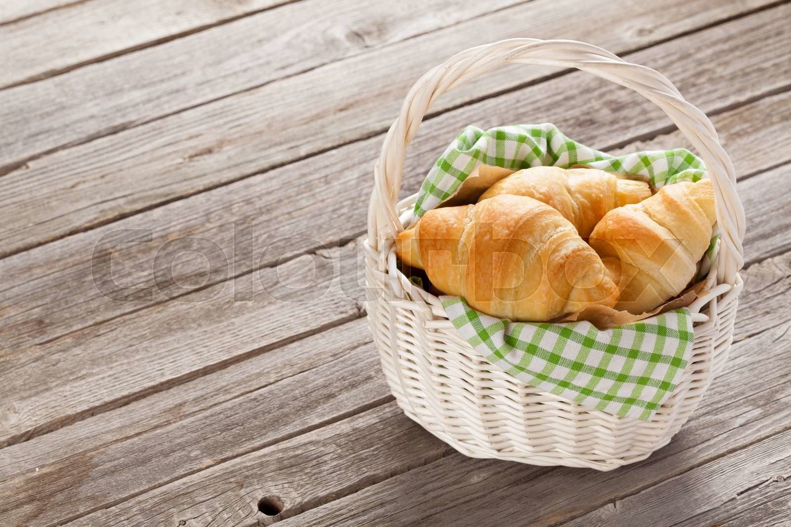 Fresh croissants basket | Stock image | Colourbox