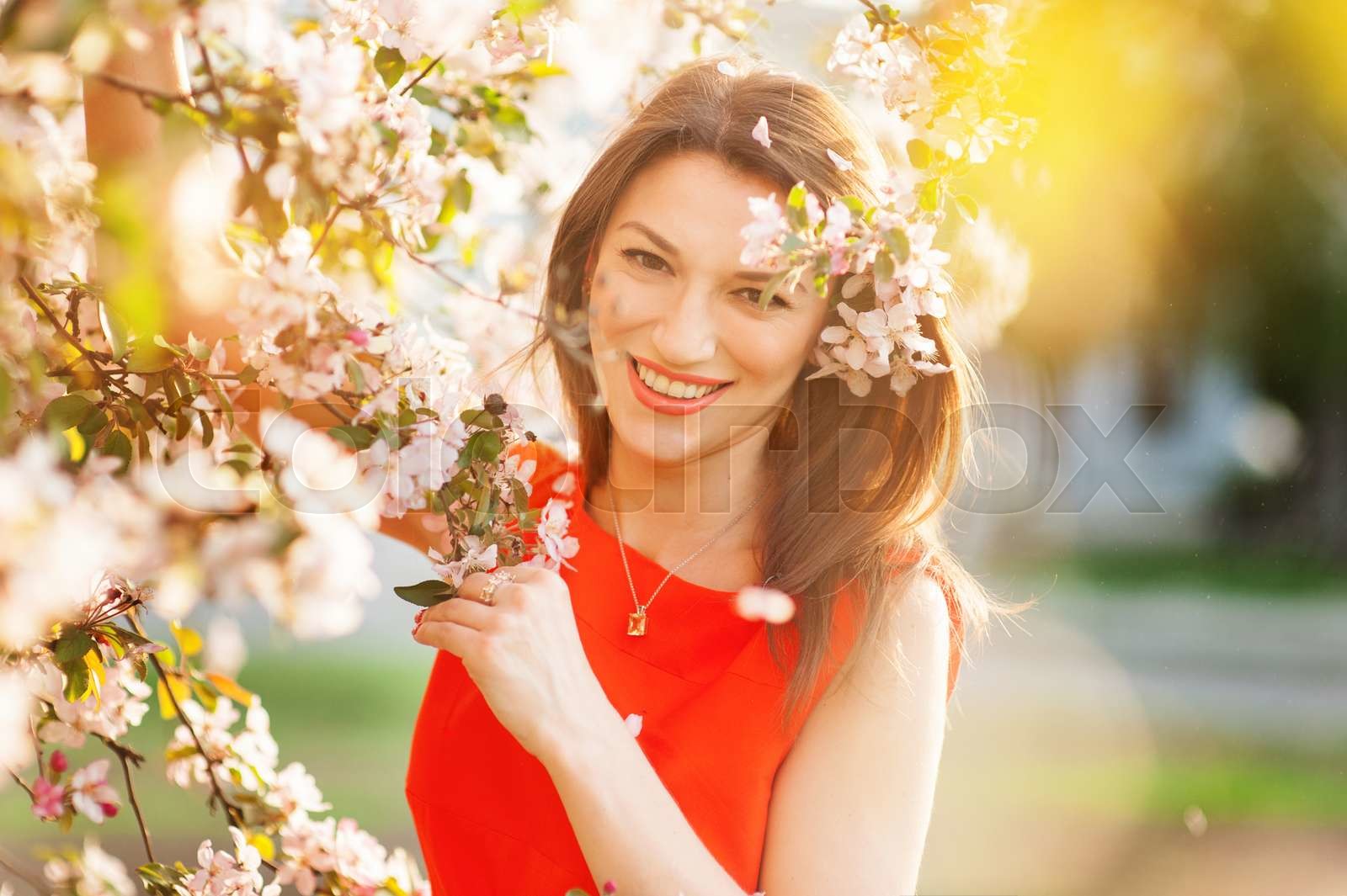Sensual portrait of spring woman, beautiful face female enjoying cherry ...