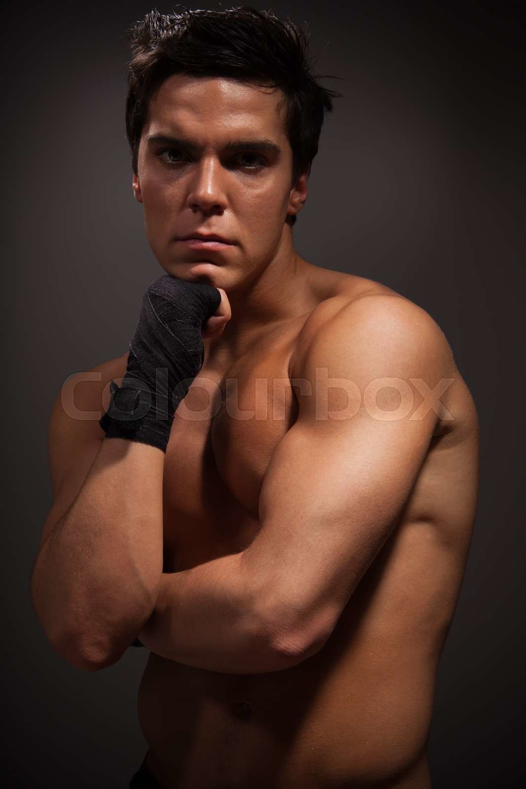 Handsome muscular man thinking | Stock image | Colourbox