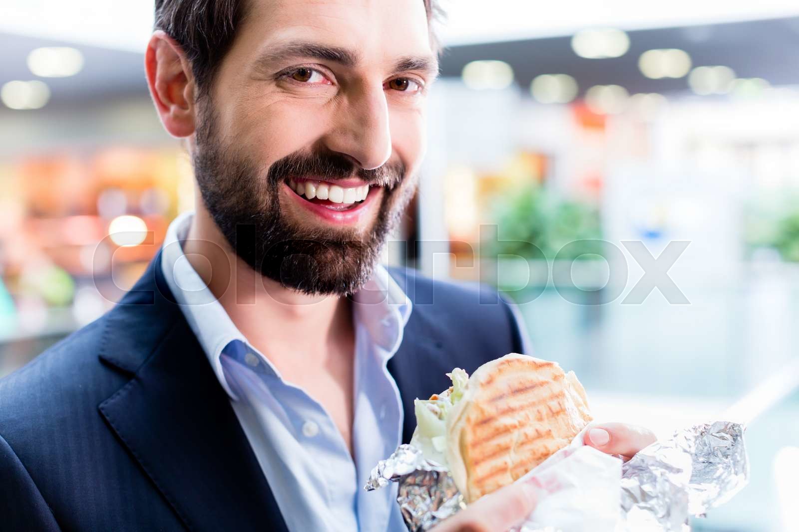 Man eating Doner Kebap | Stock image | Colourbox
