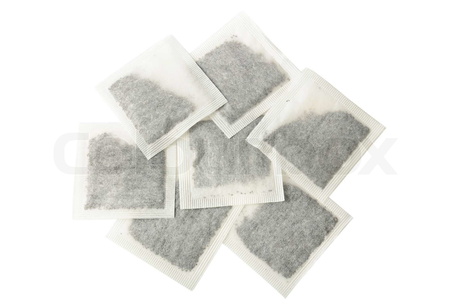 Group of square dry teabags on white | Stock image | Colourbox