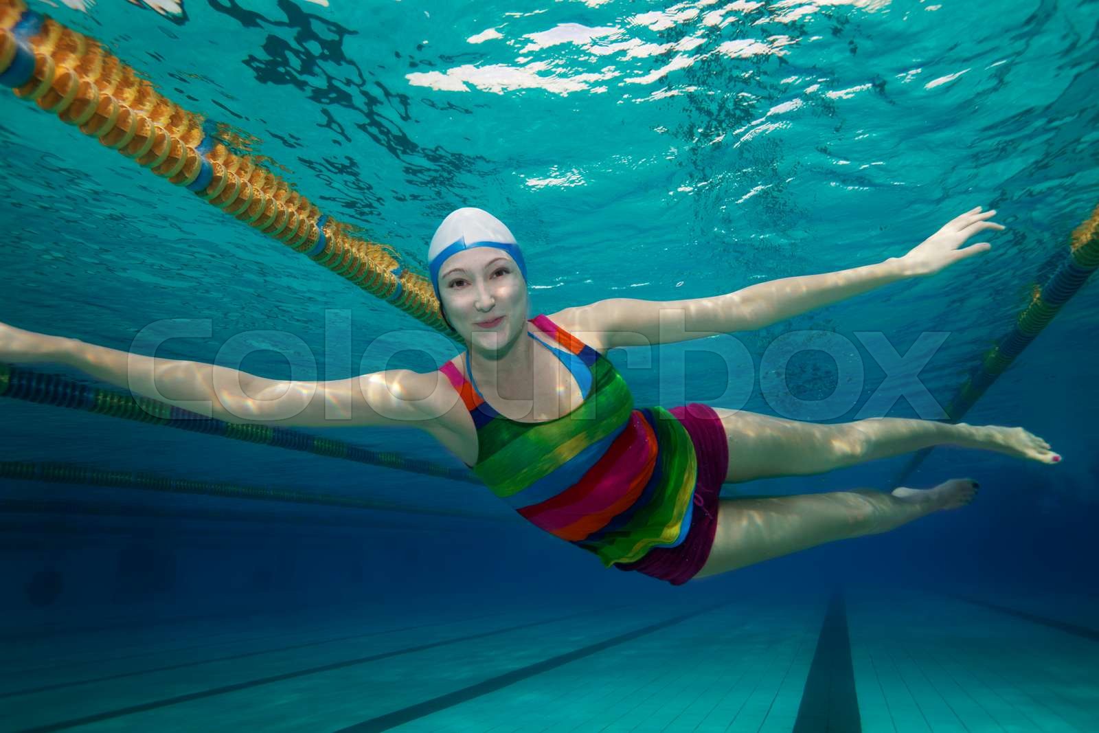 Happy swimming in the pool | Stock image | Colourbox