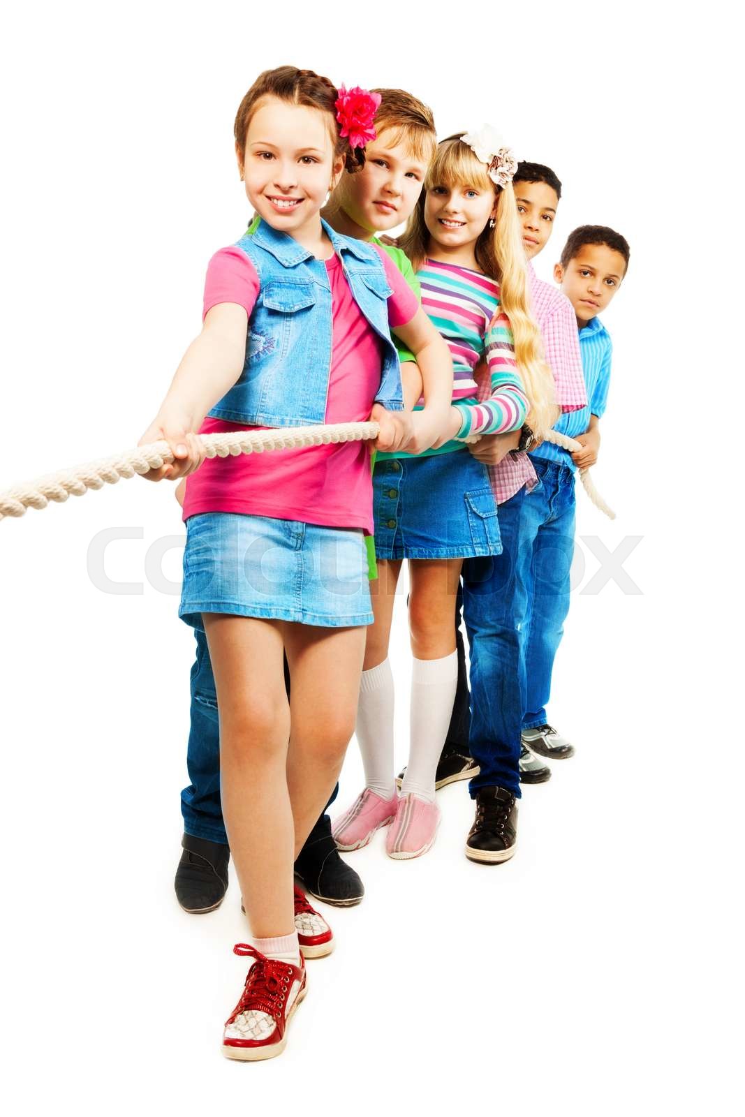 Kids pulling rope | Stock image | Colourbox