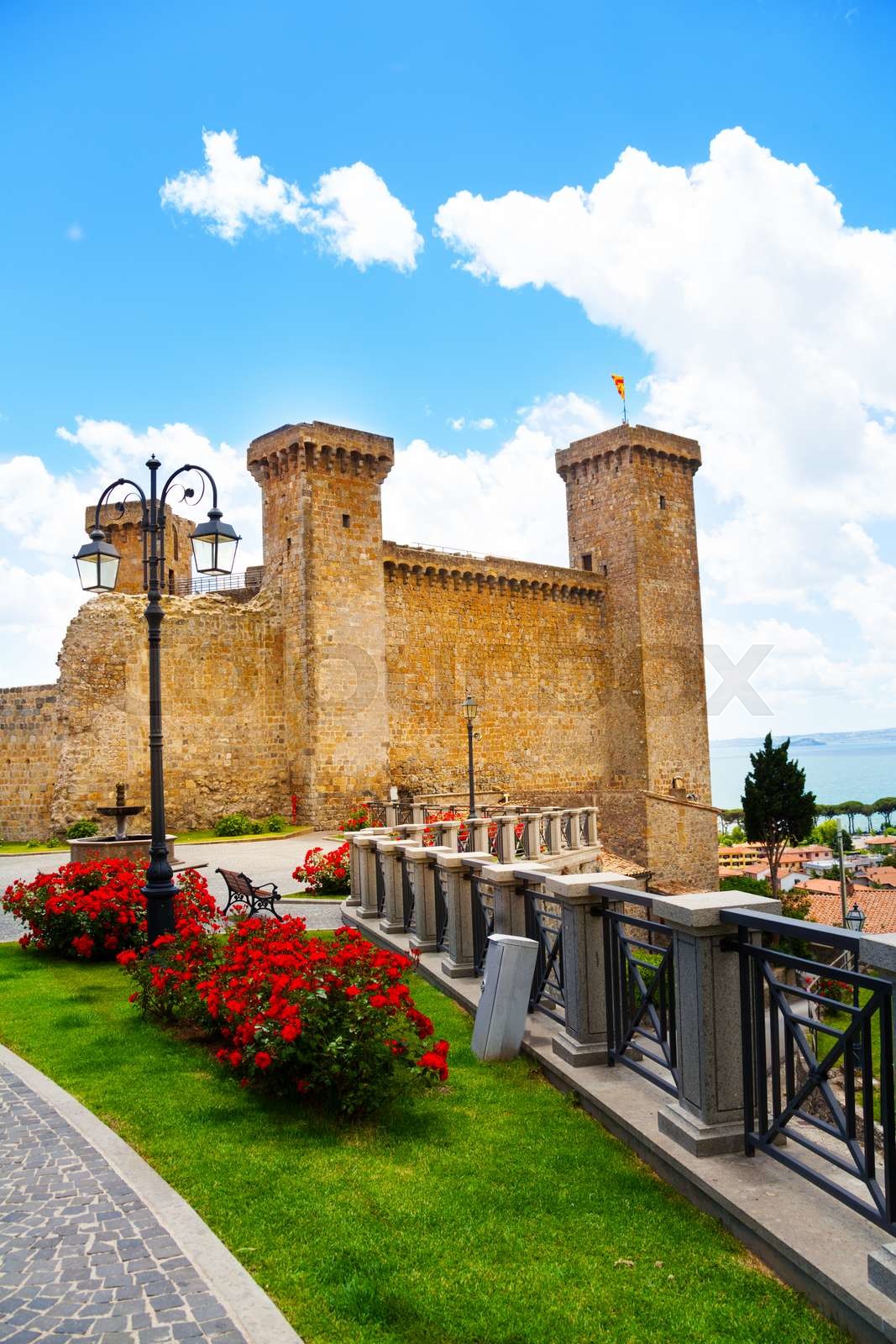 Bolsena castle and flower beds | Stock image | Colourbox