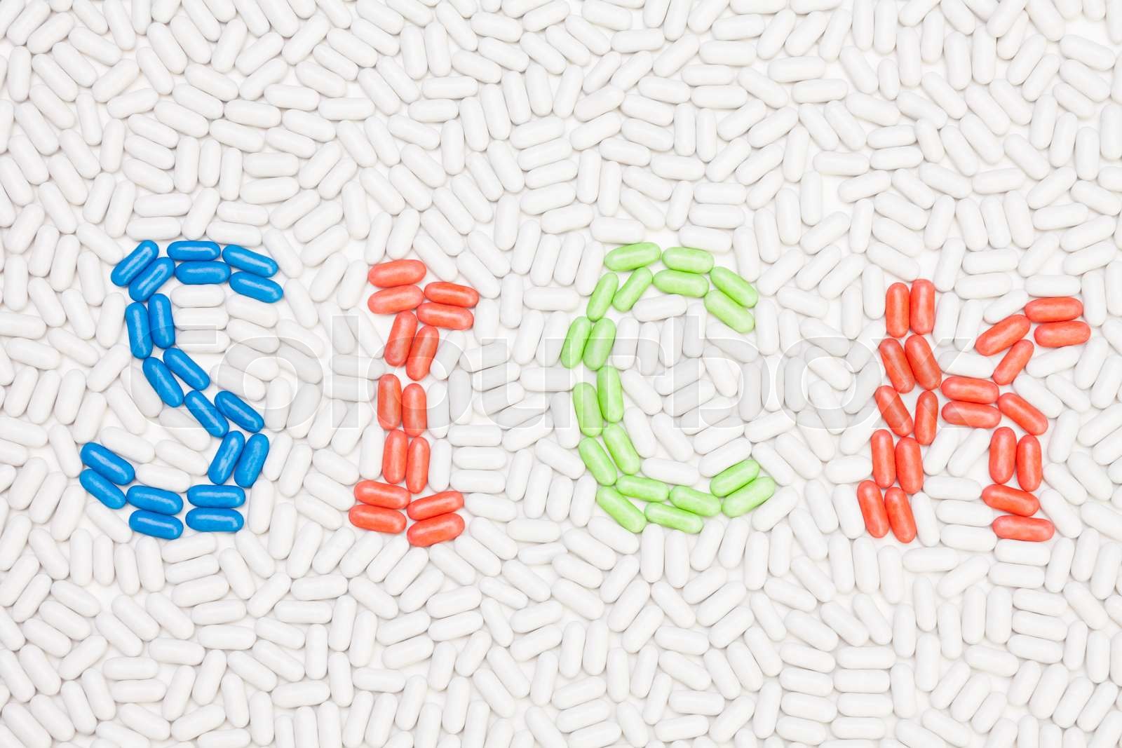 Sick text made of pills | Stock image | Colourbox