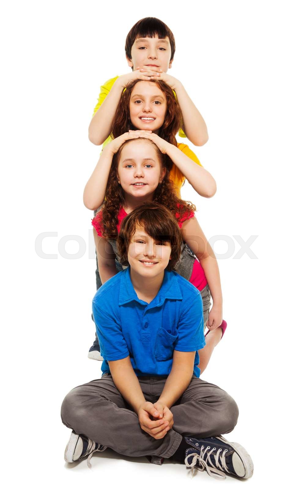 Kids together in a row | Stock image | Colourbox
