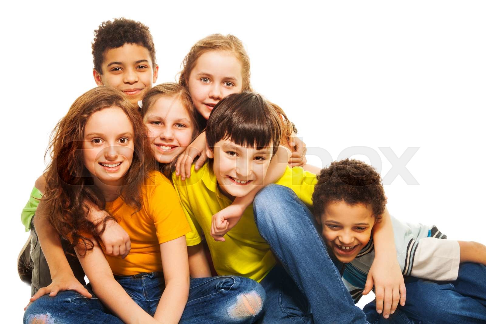 Group of hugging and laughing kids | Stock image | Colourbox