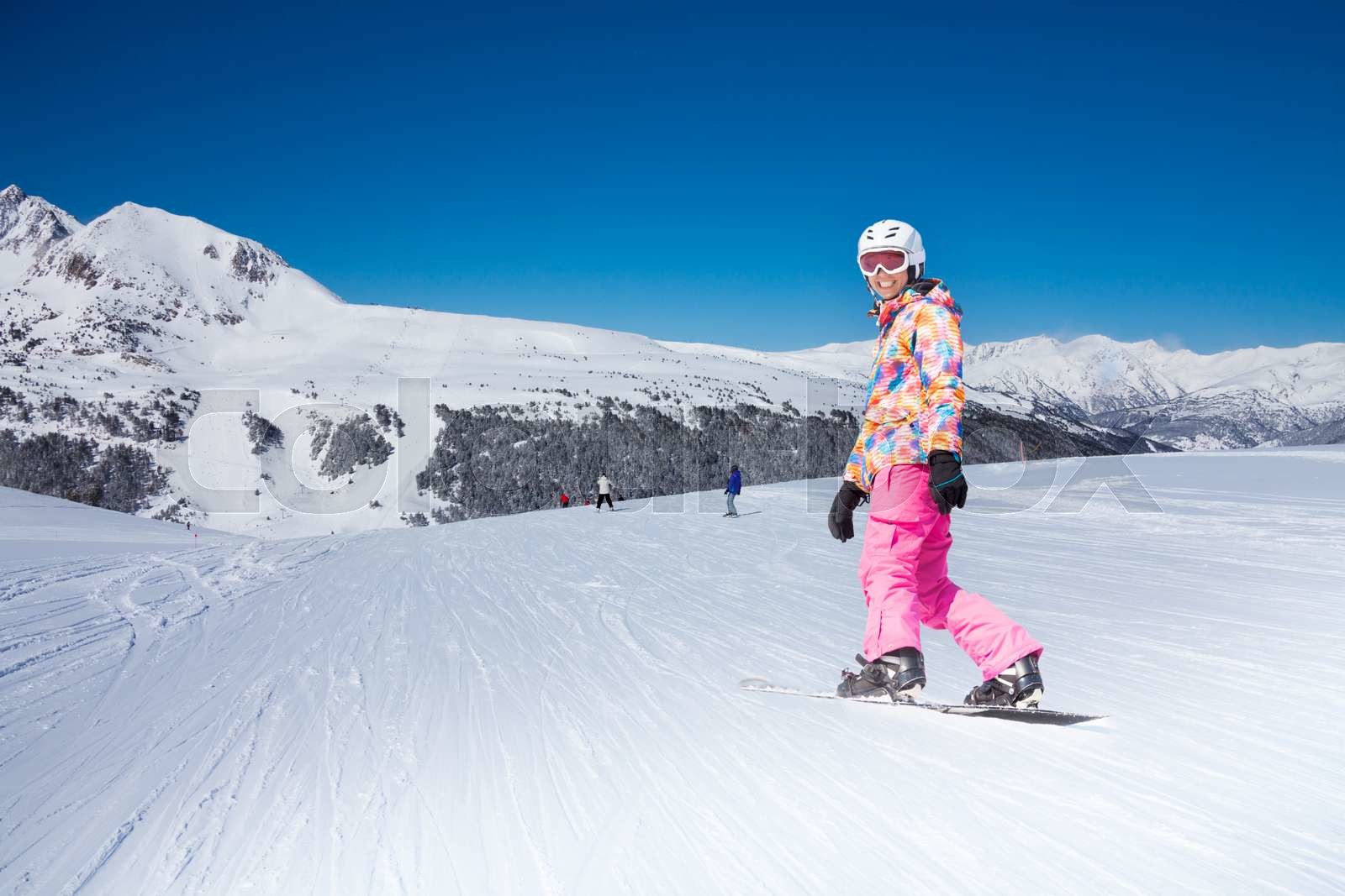 Woman sliding downhill | Stock image | Colourbox