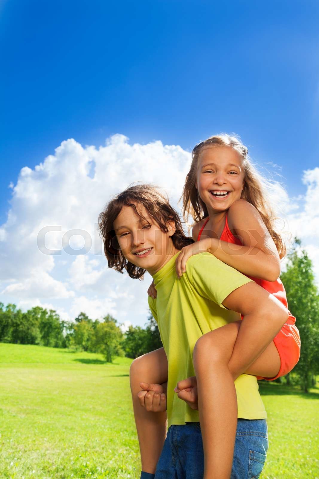 Girl ride on boy | Stock image | Colourbox