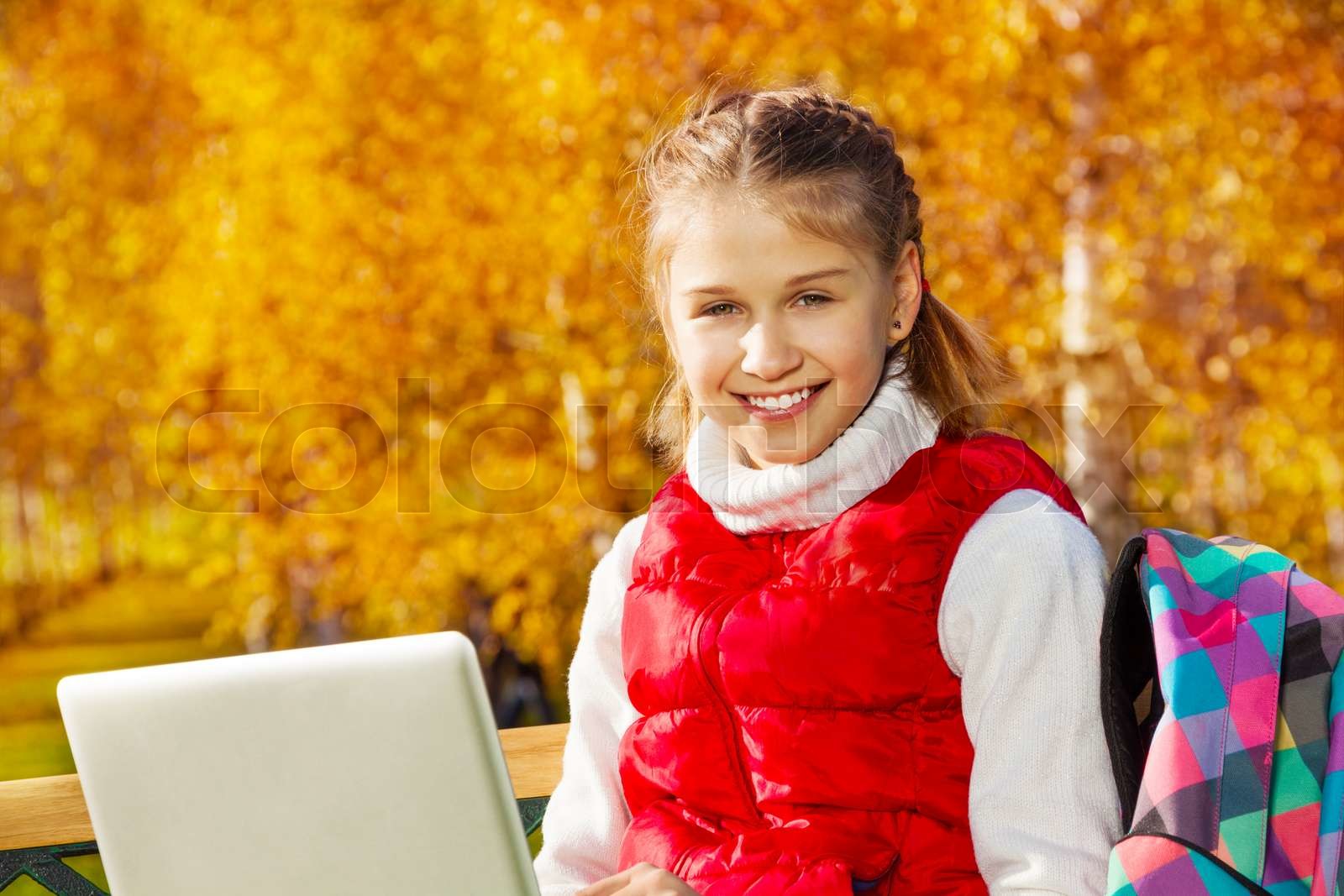 Portrait of girl with computer | Stock image | Colourbox