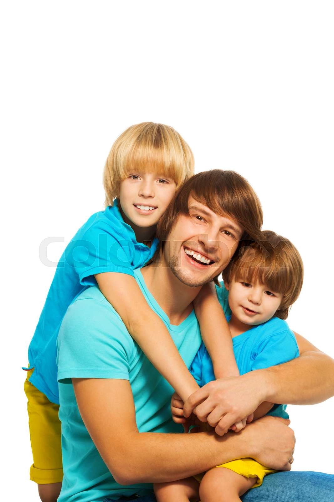 Dad with two little sons | Stock image | Colourbox