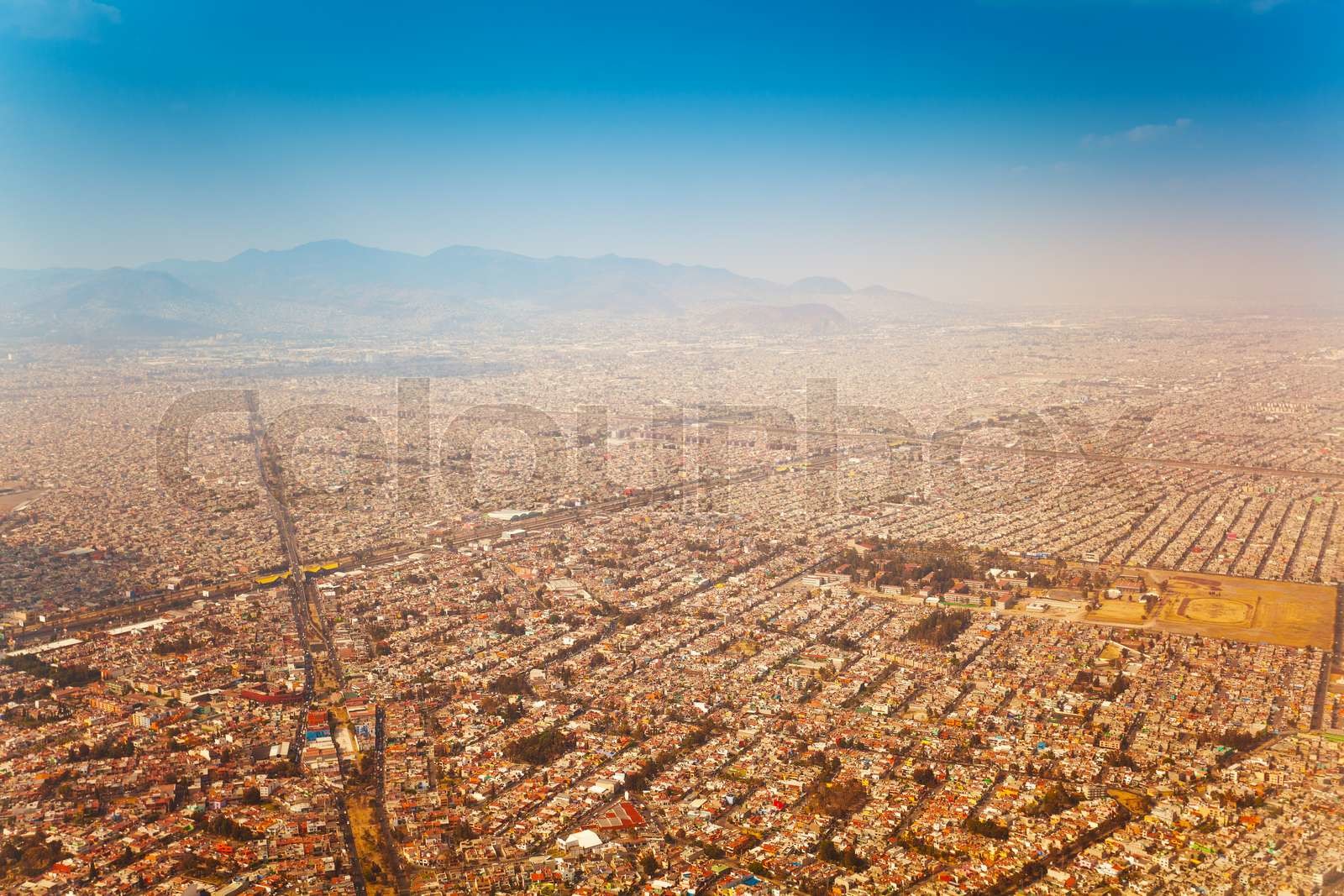 Mexico city outskirts areal view in morning | Stock image | Colourbox