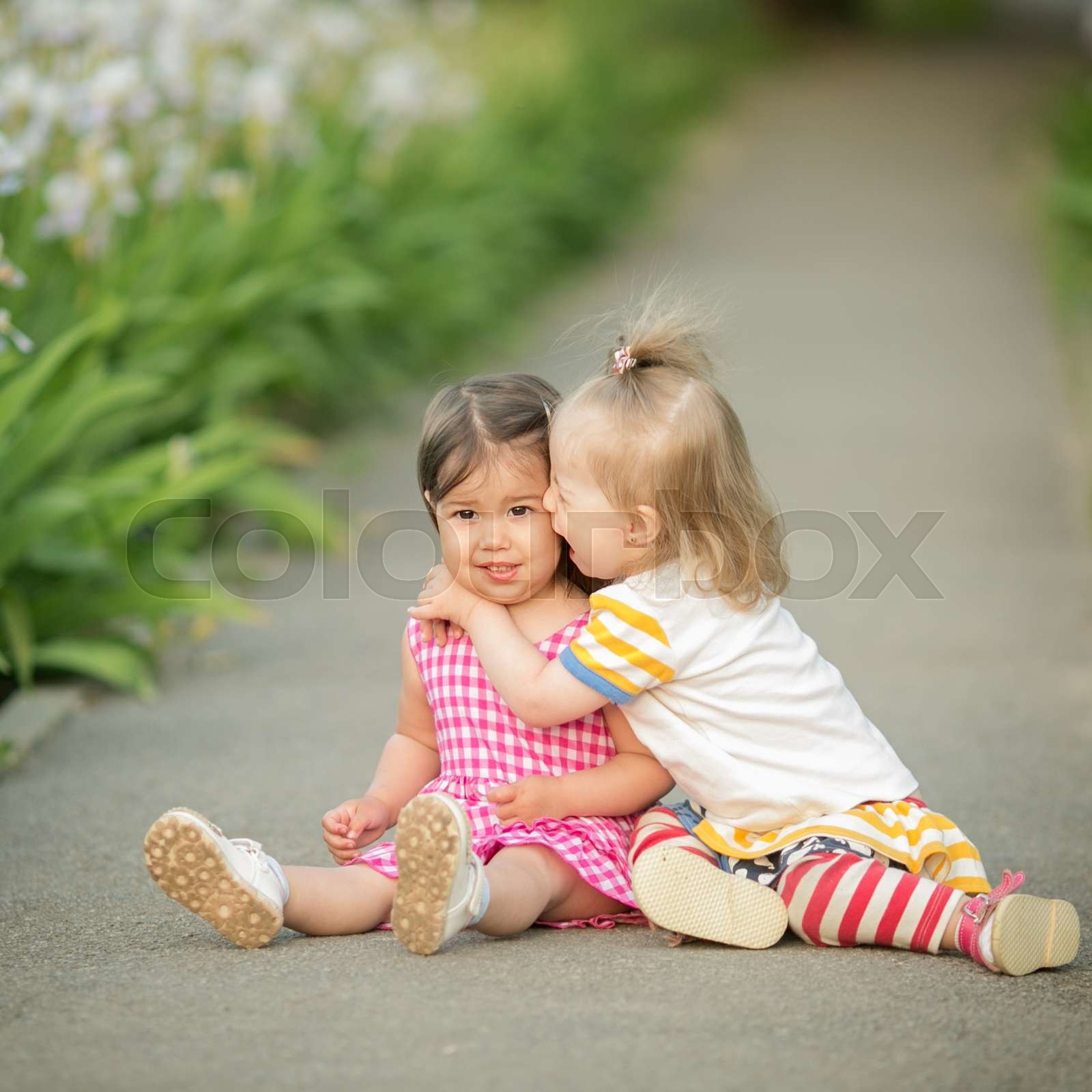 two friends hug each other | Stock image | Colourbox