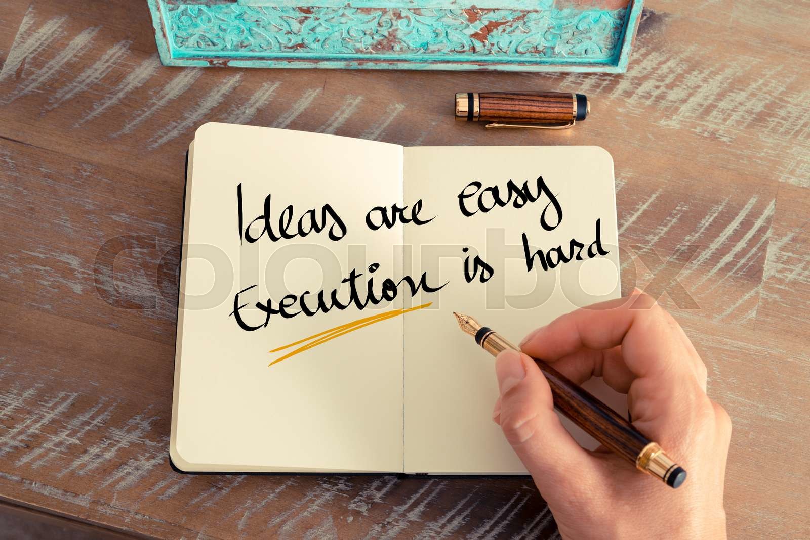 Handwritten text Ideas Are Easy Execution is Hard | Stock image | Colourbox