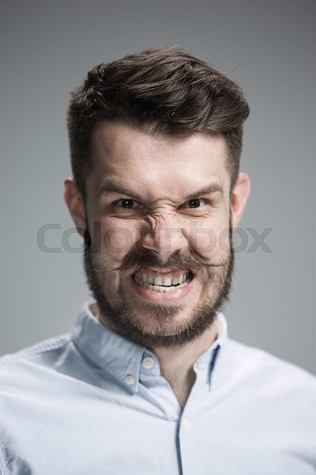 Close up face of angry man | Stock image | Colourbox