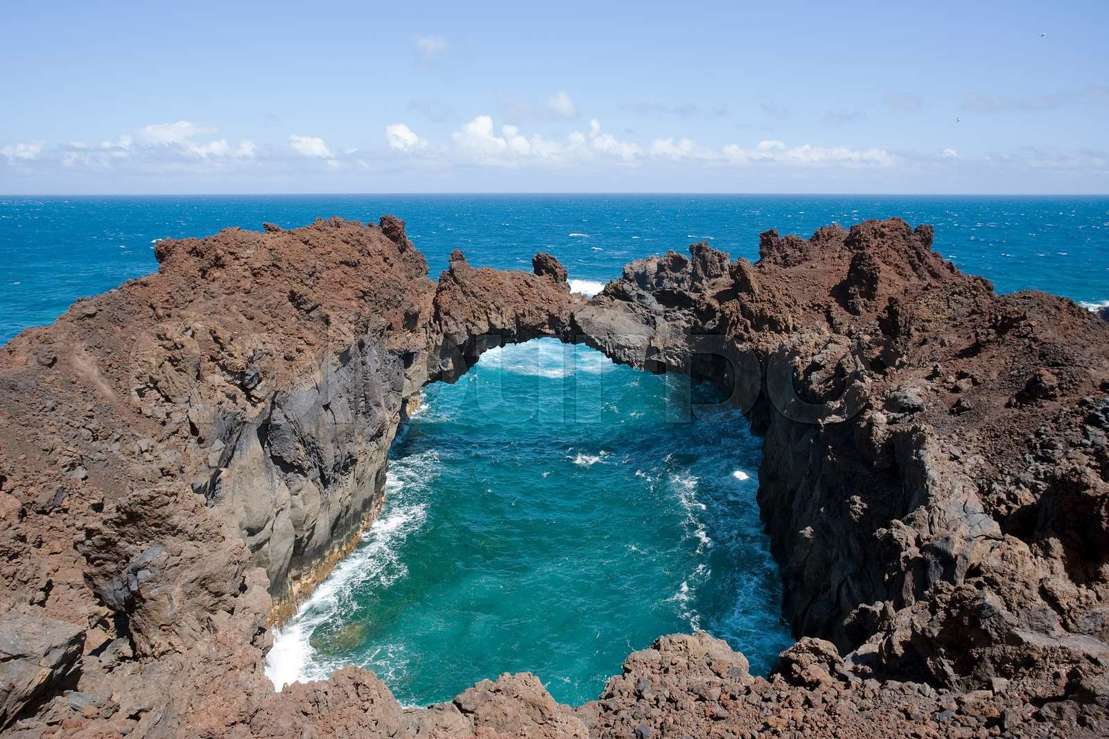 natural lava stone arch Arco de la Tosca, El Hierro | Stock image ...