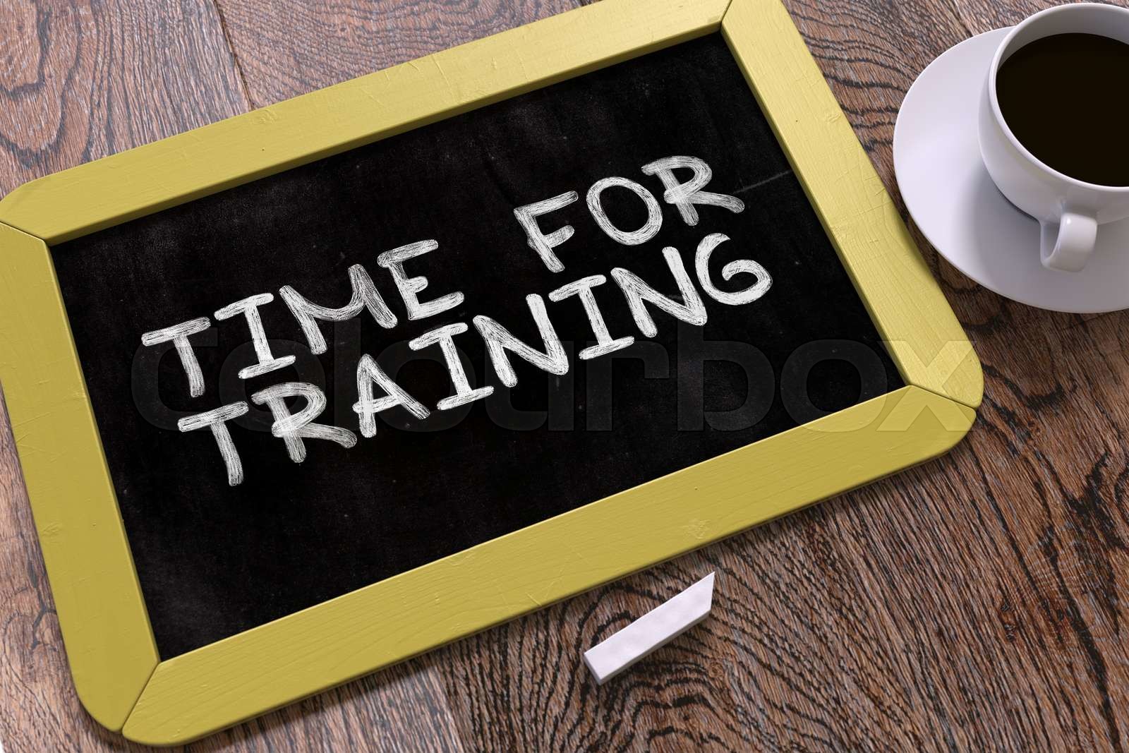 Handwritten Time for Training on a Chalkboard. | Stock image | Colourbox