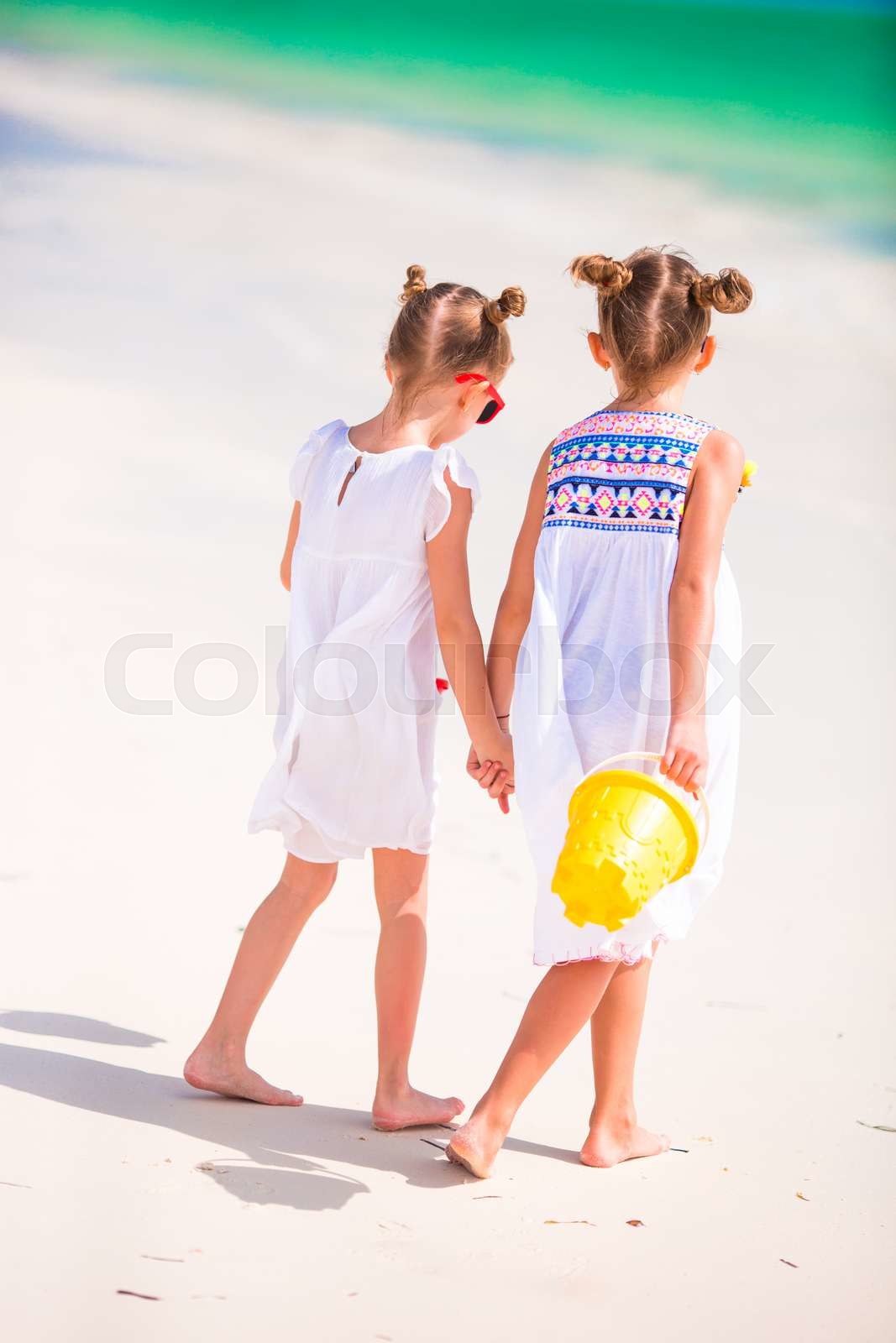 Little adorable girls during tropical beach vacation | Stock image ...