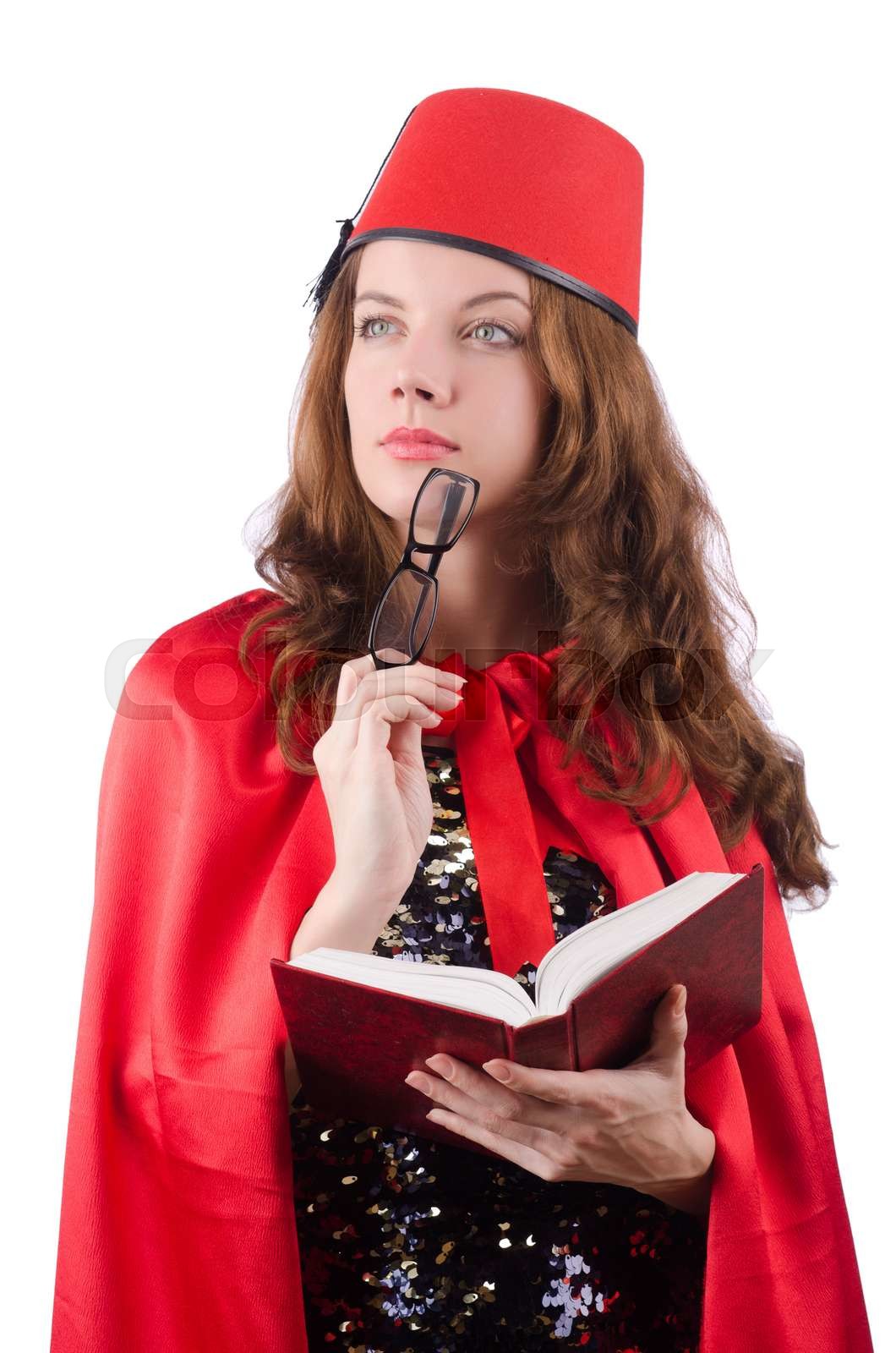 Woman wearing fez hat isolated on white | Stock image | Colourbox